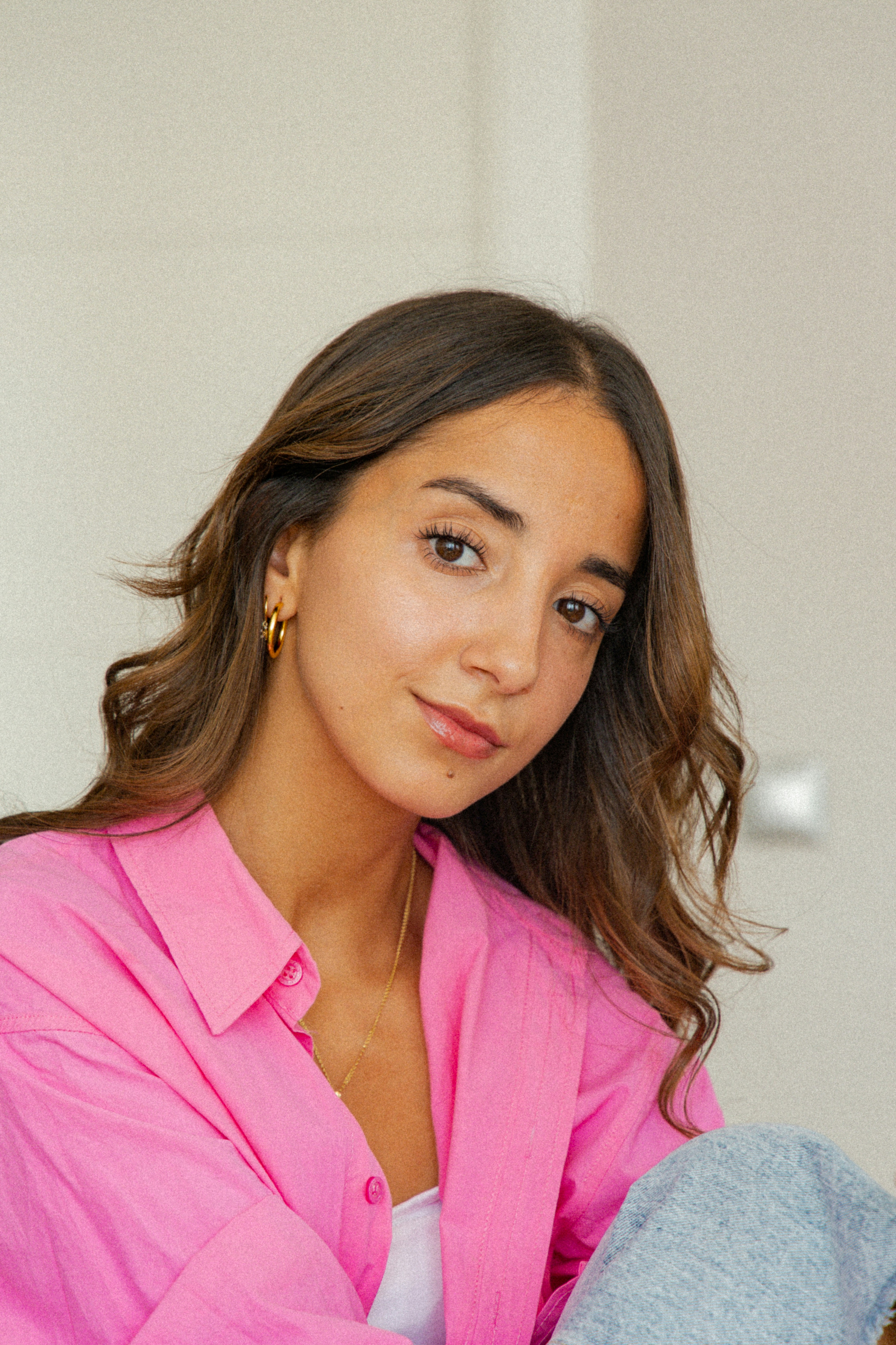woman in pink button up shirt