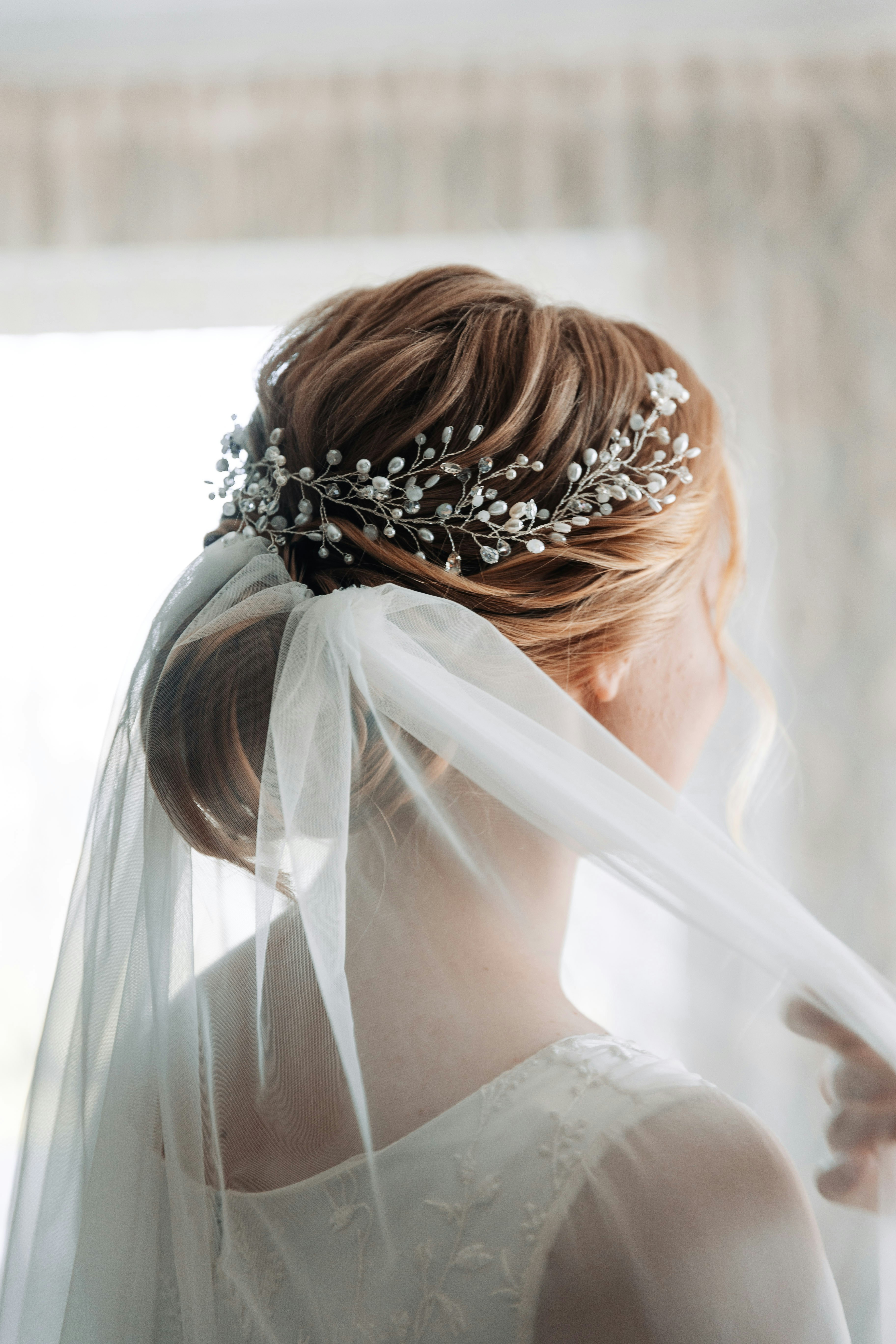 Wedding hairstyle | woman in white wedding dress