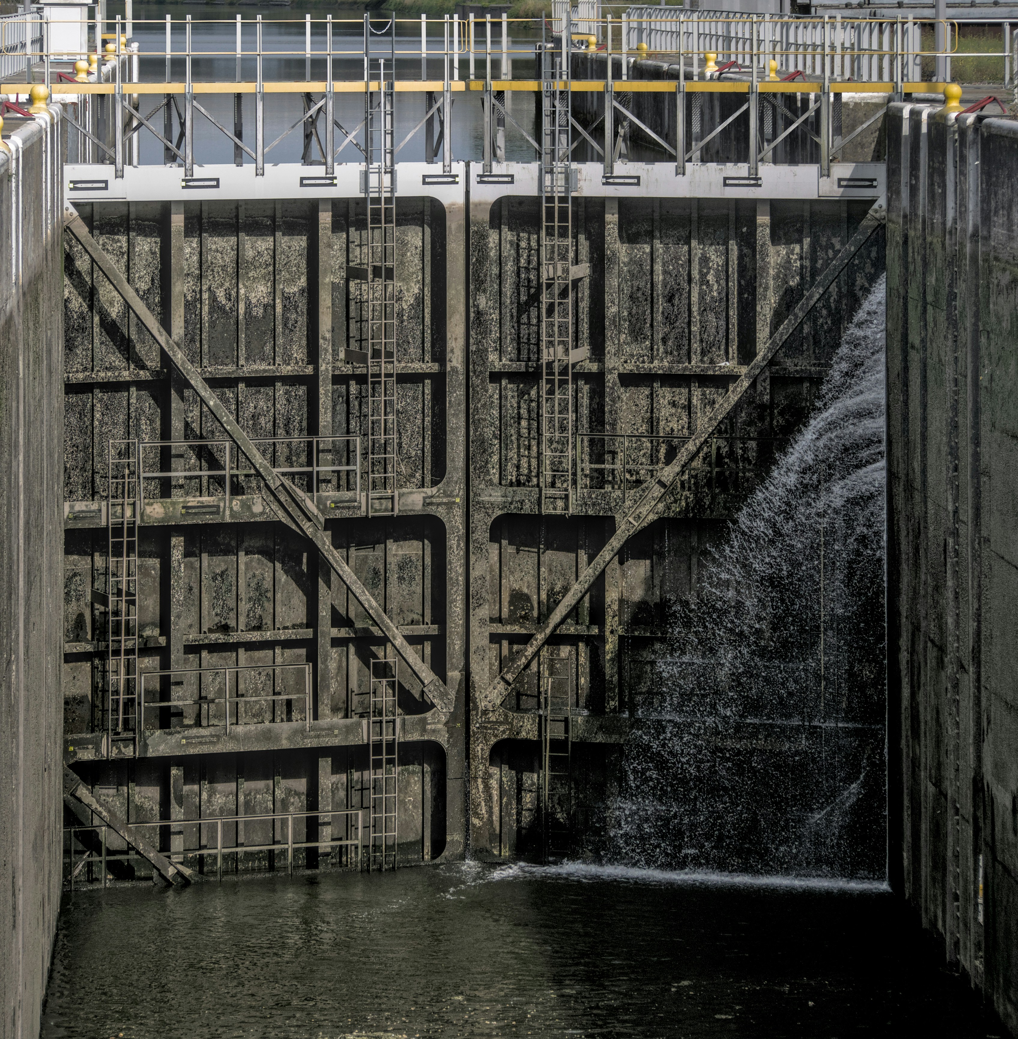 Gray concrete bridge over river photo – Free Water canal gate Image on ...