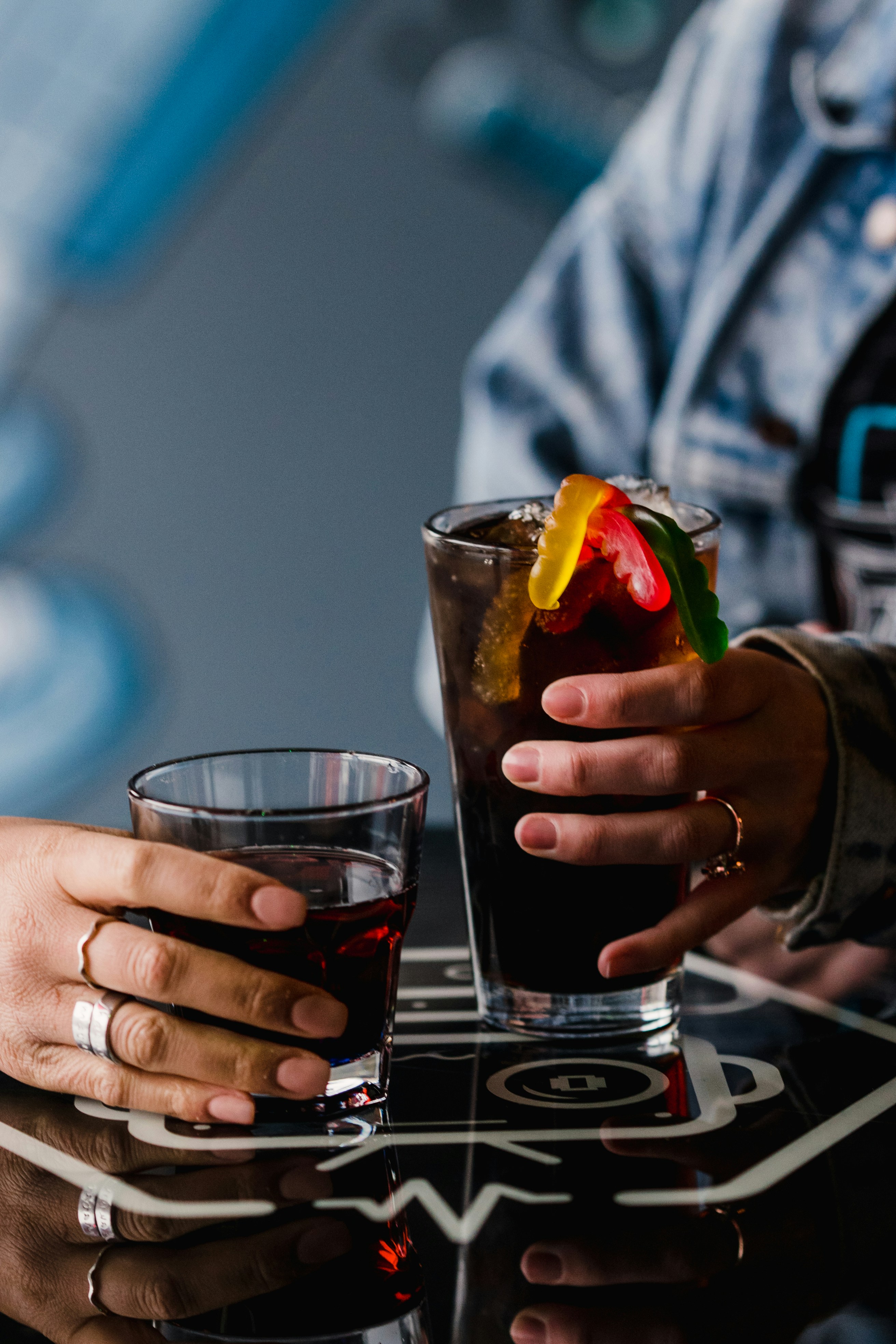 Two Hands, Two Glasses: A Moment shared at the Bar