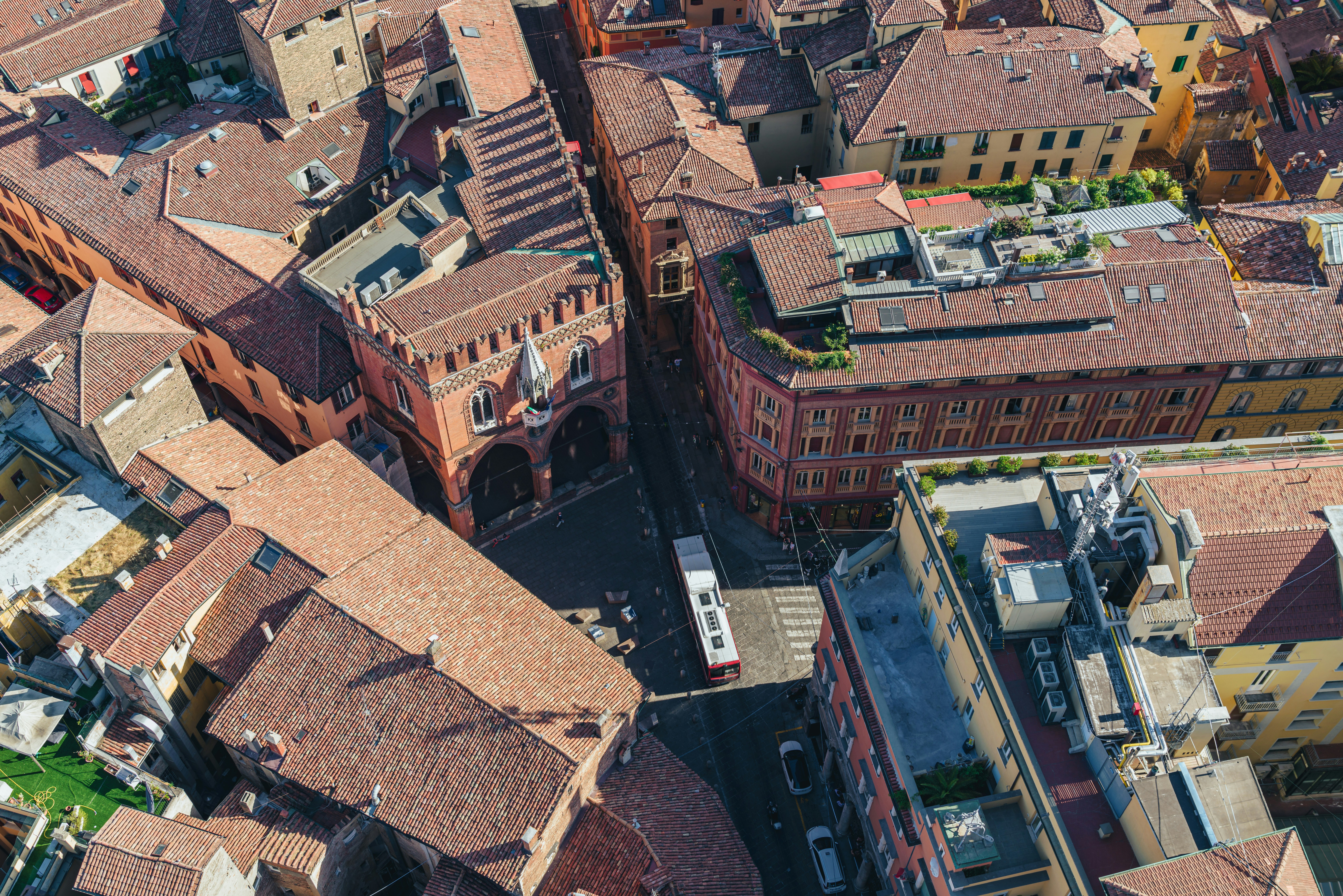 Terracotta Labyrinth: Aerial Slice Through a Sunlit Old Town