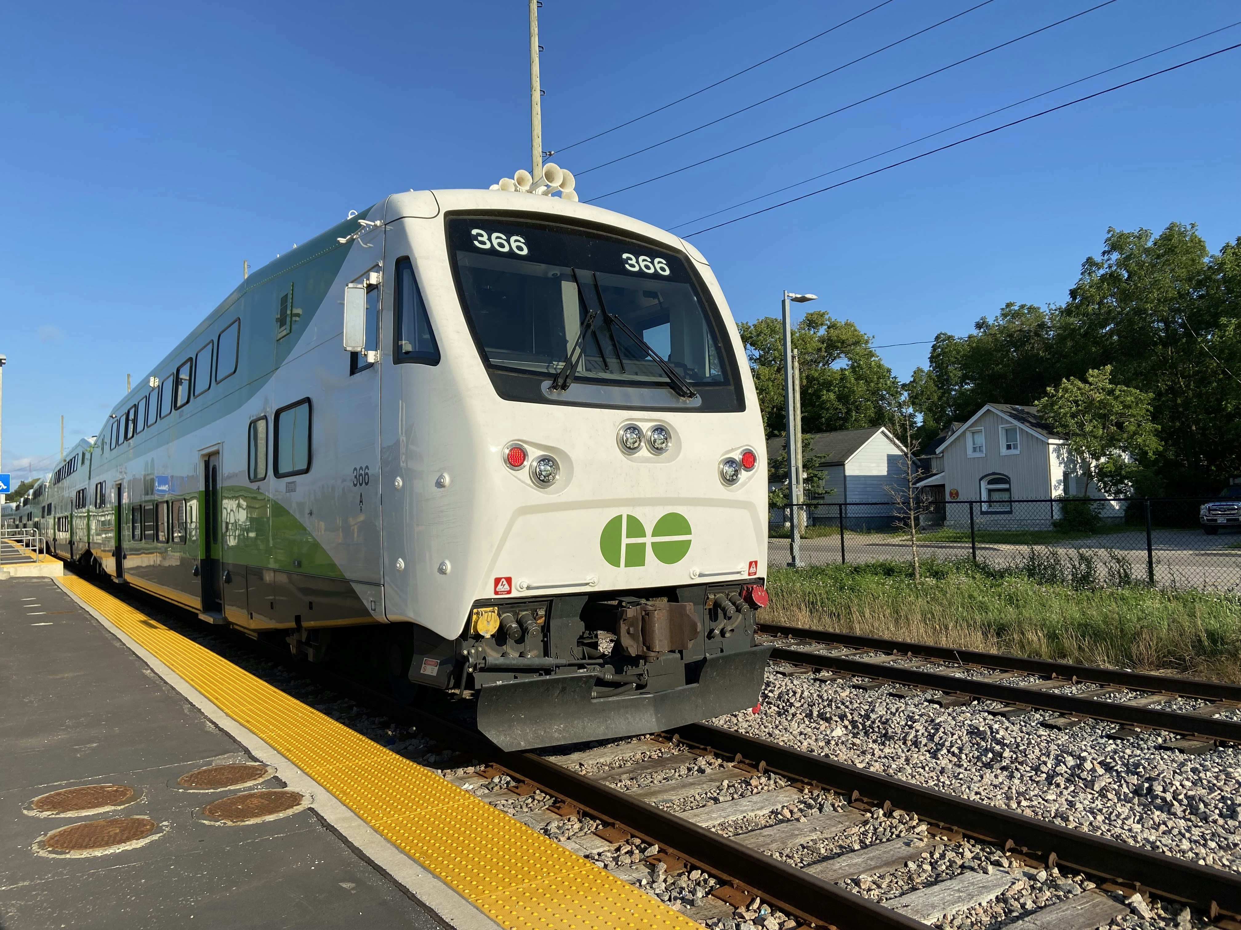 White and green train on rail tracks during daytime photo – Free Train ...