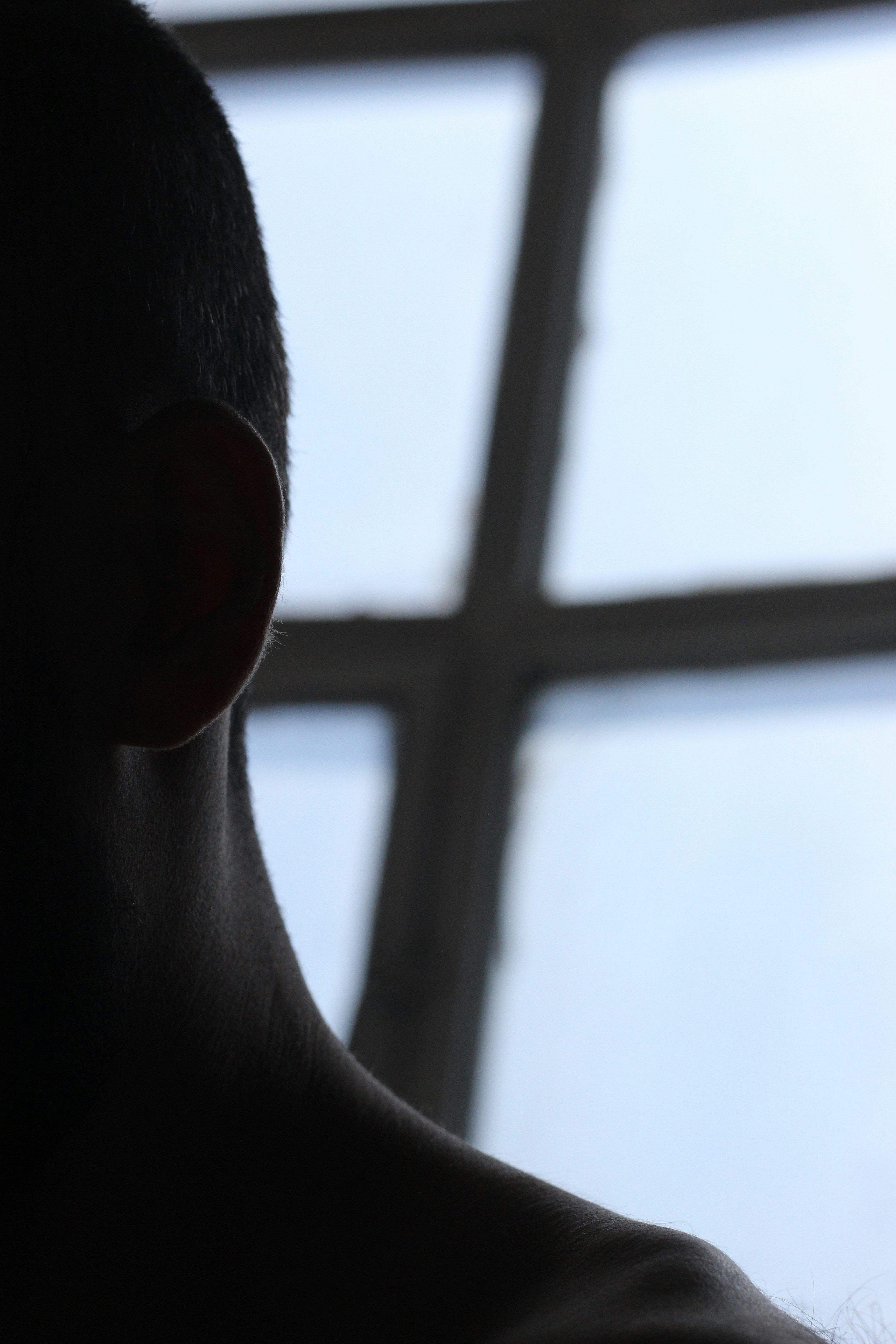Person near window during daytime photo – Free Human Image on Unsplash