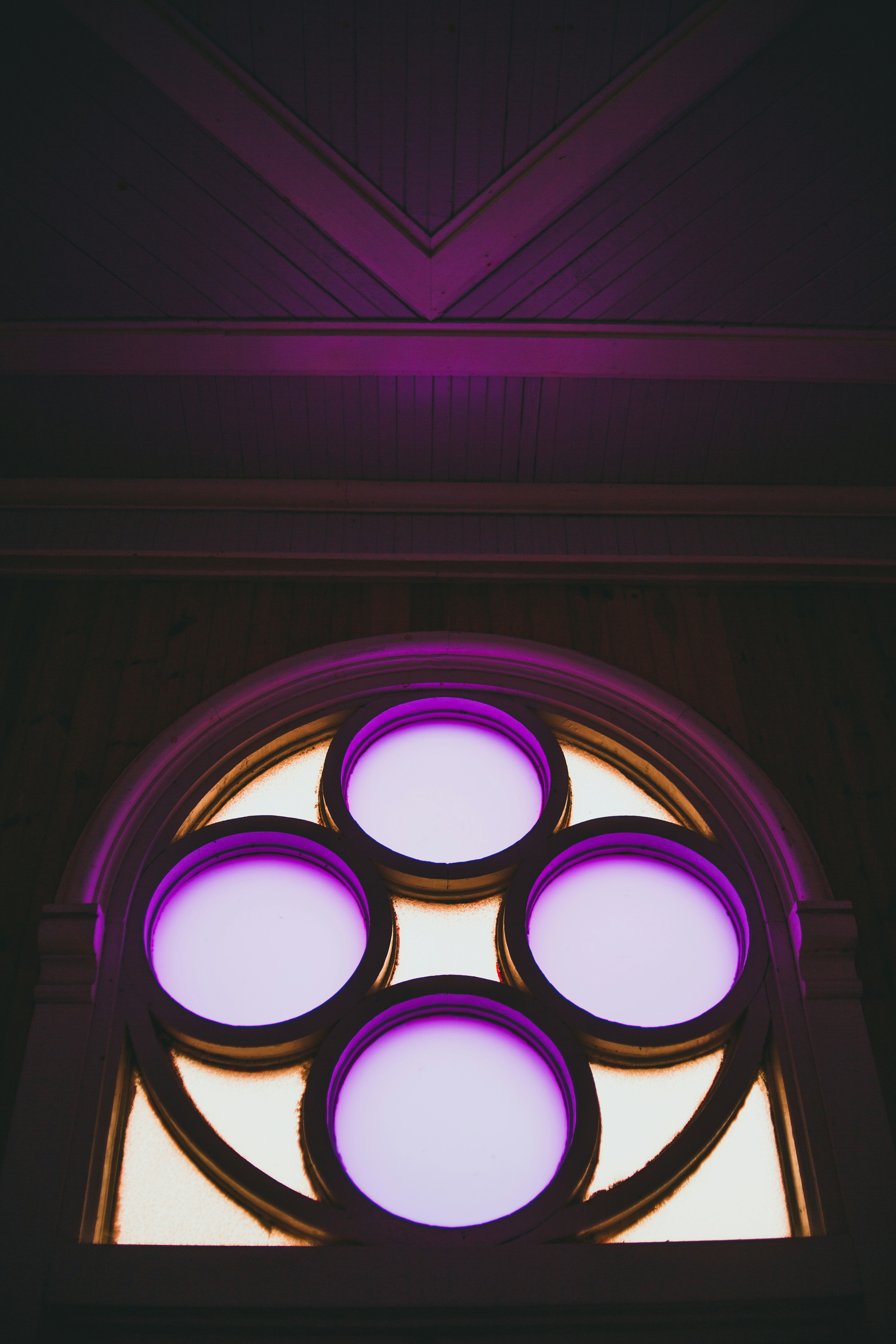 white and purple round ceiling light