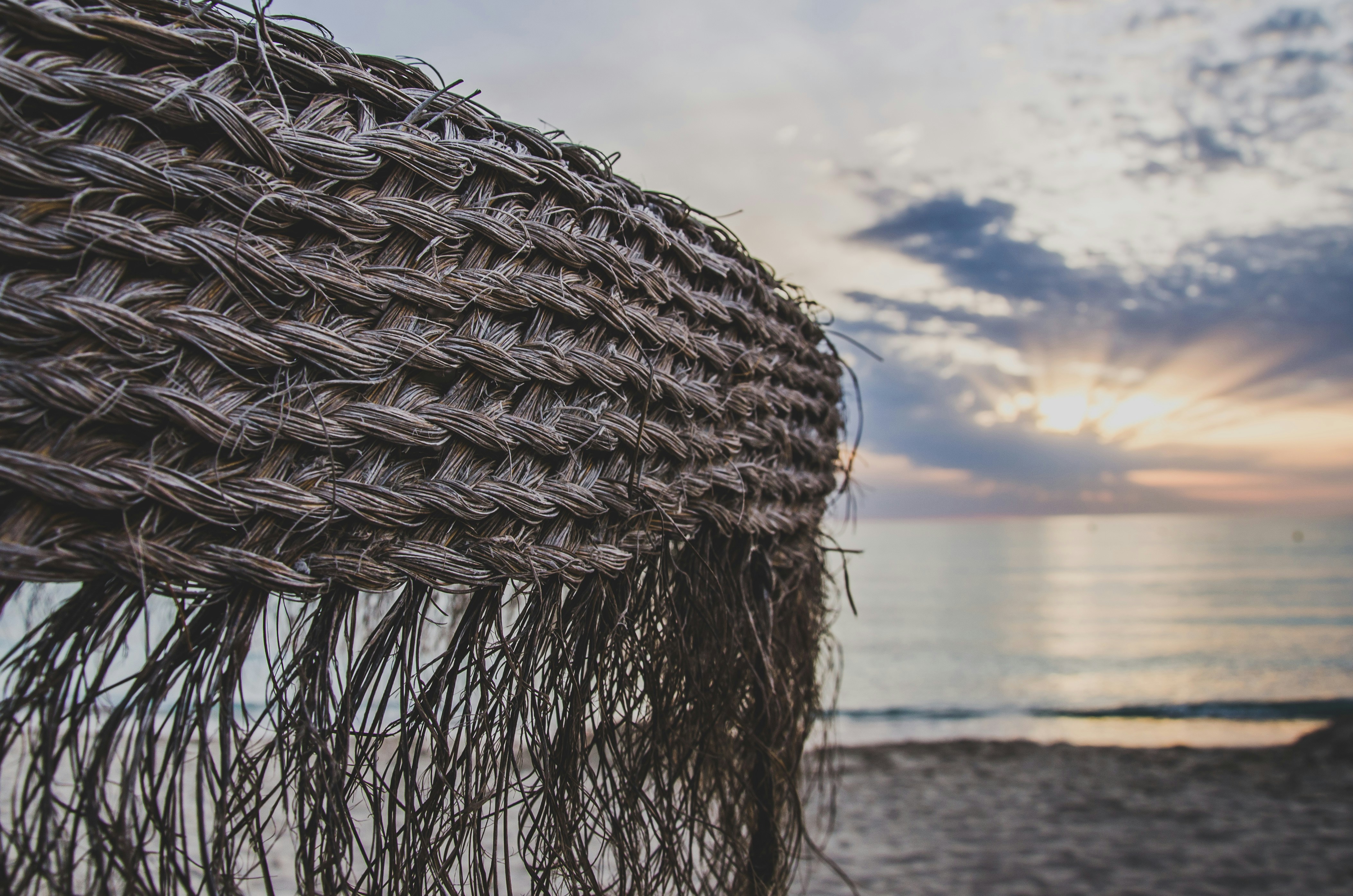 Frayed Horizon: Sunset Weave by the Shore