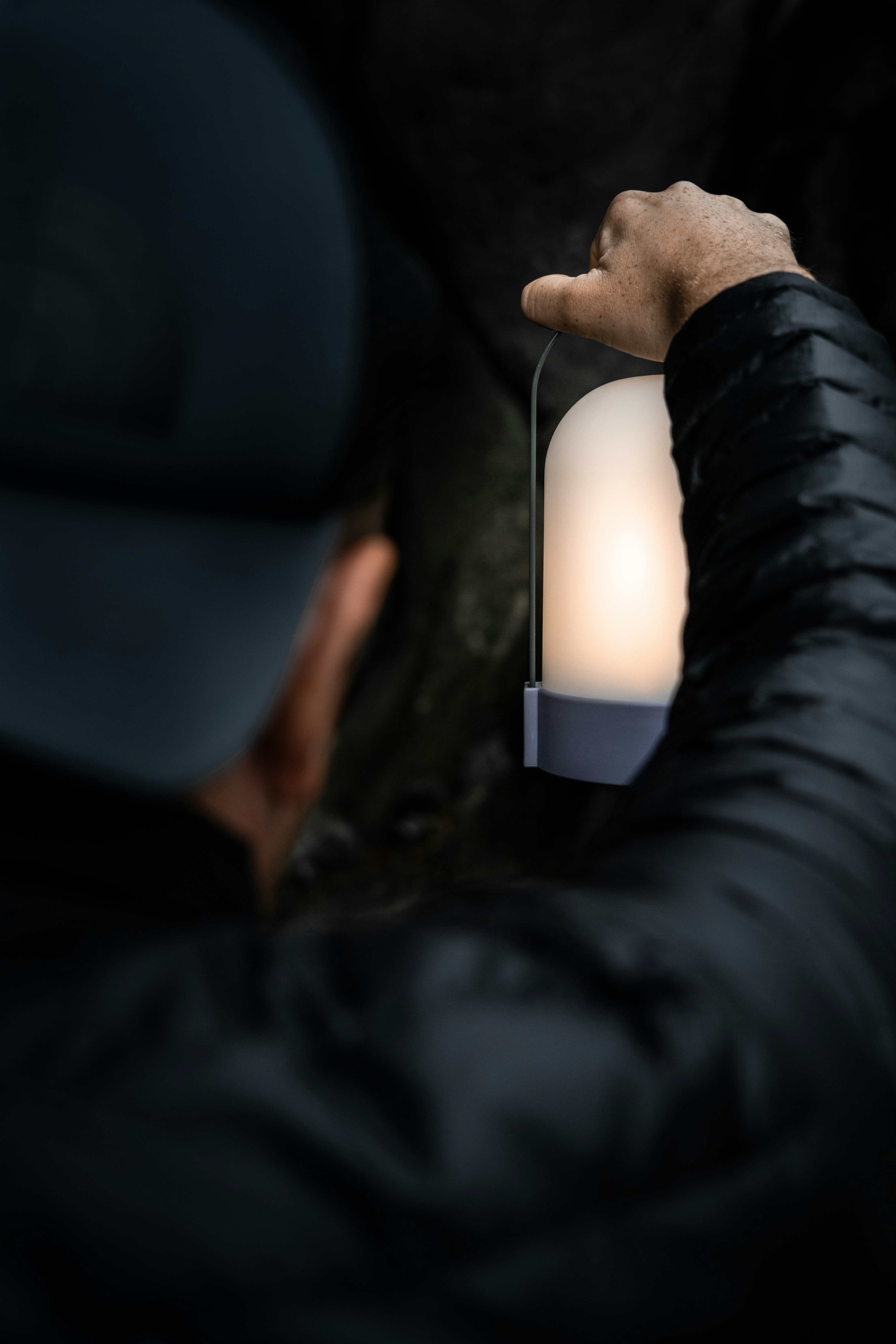 Cavern Lantern: A Quiet Moment of Light Framed by a Familiar Hand