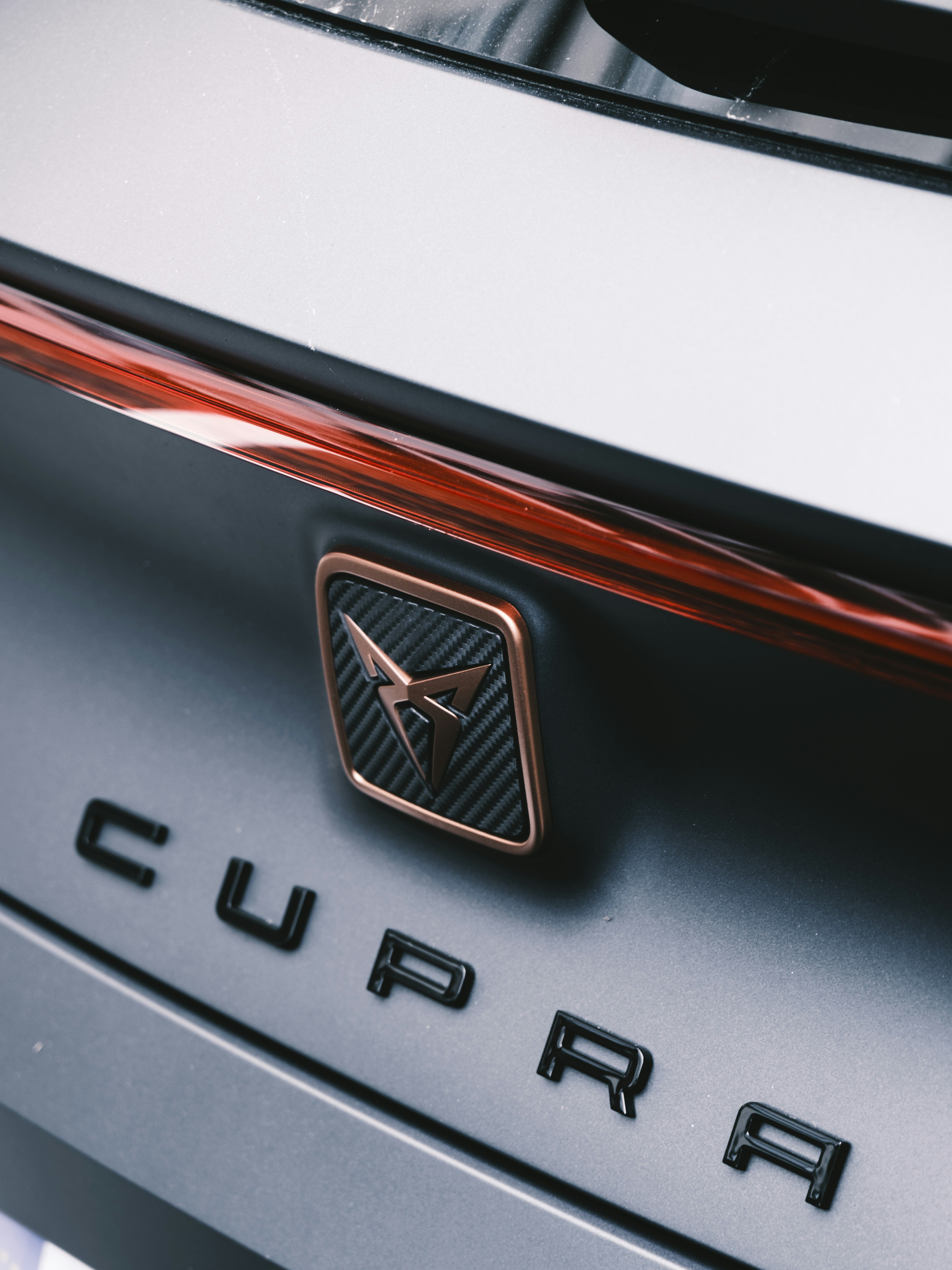 Carbon Crest: Close-Up on a CUPRA Emblem
