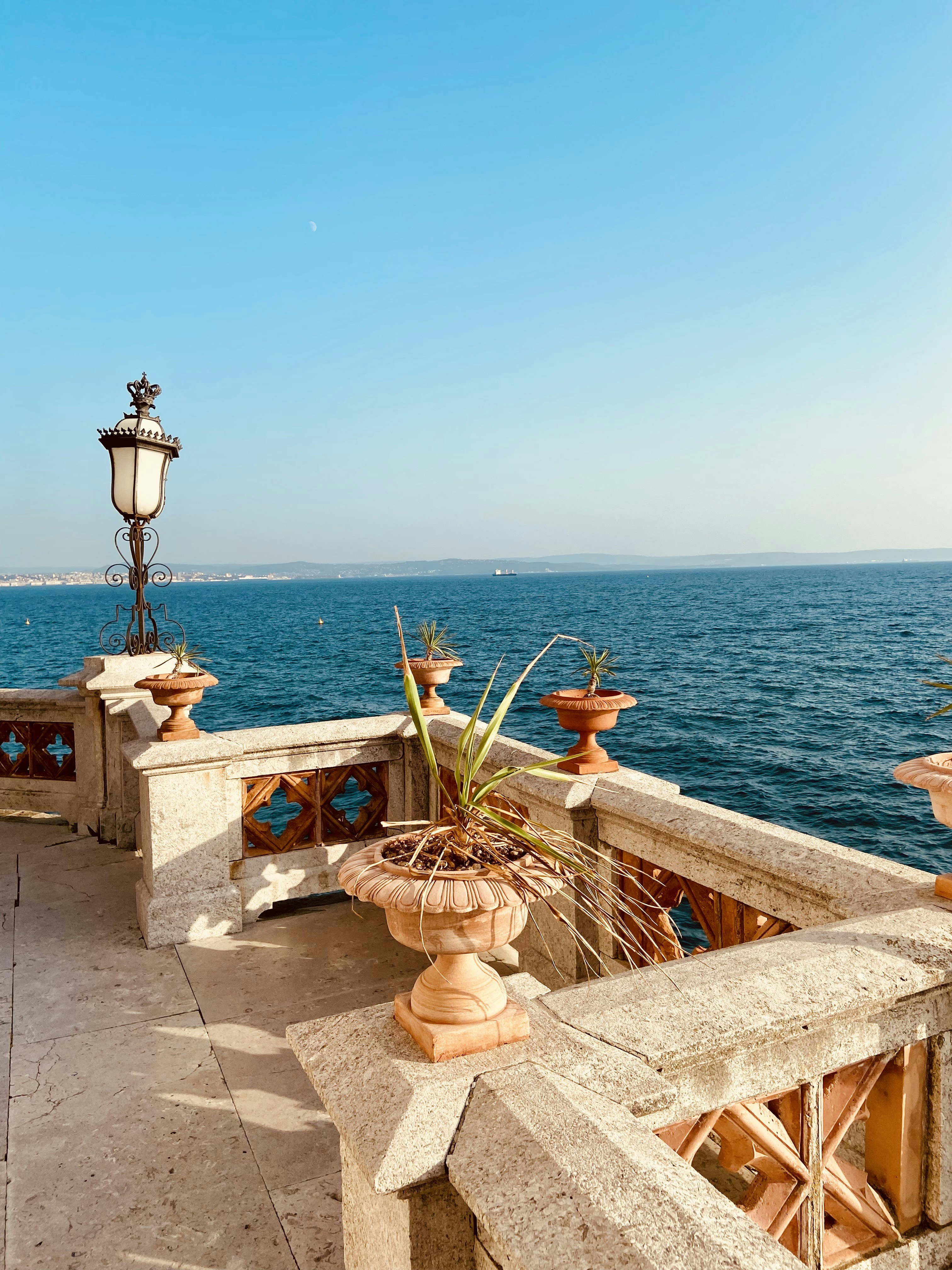 Sunlit Terrace Overlooking a Serene Sea