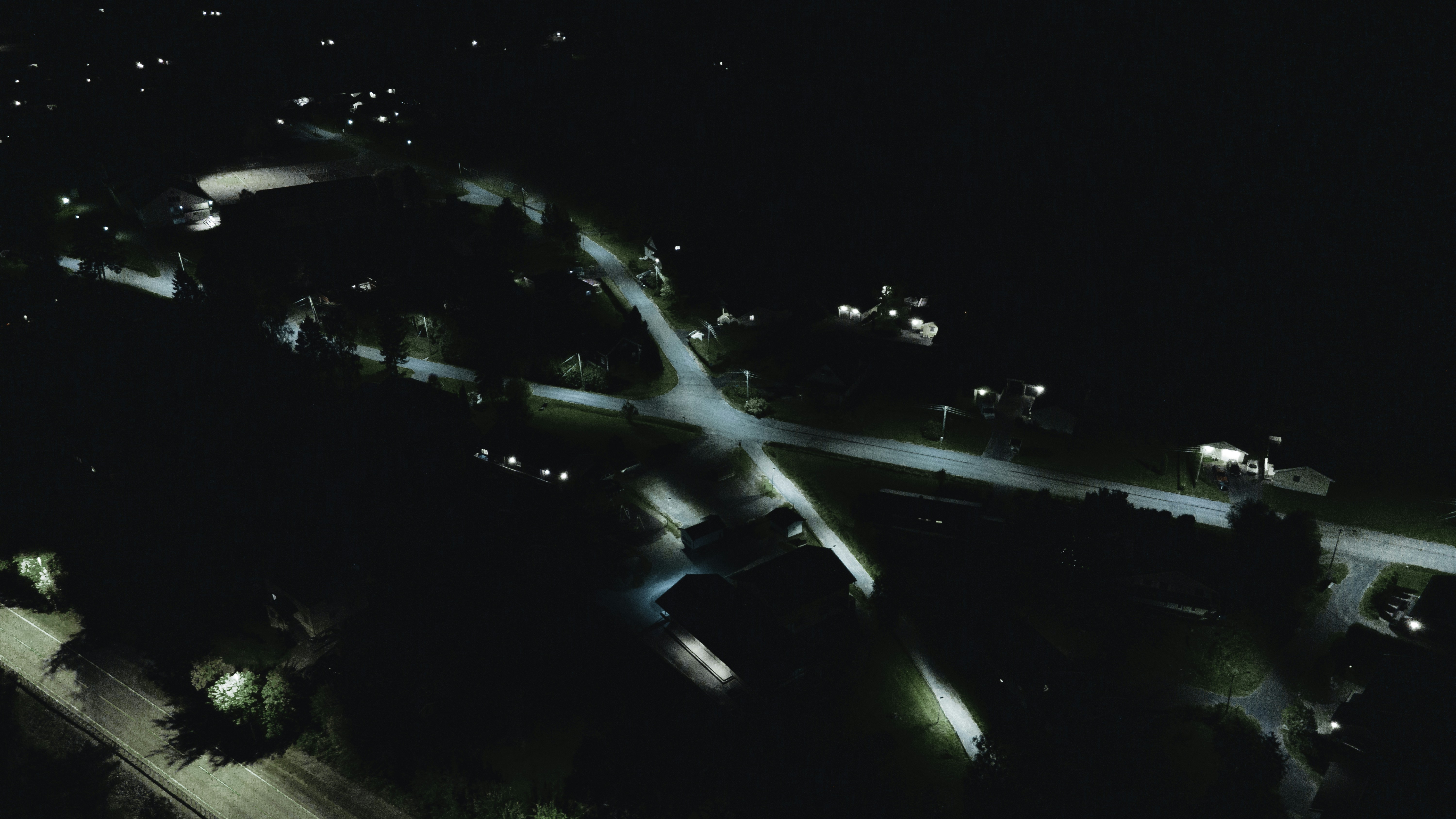 Nocturnal Arc over a Quiet Suburb
