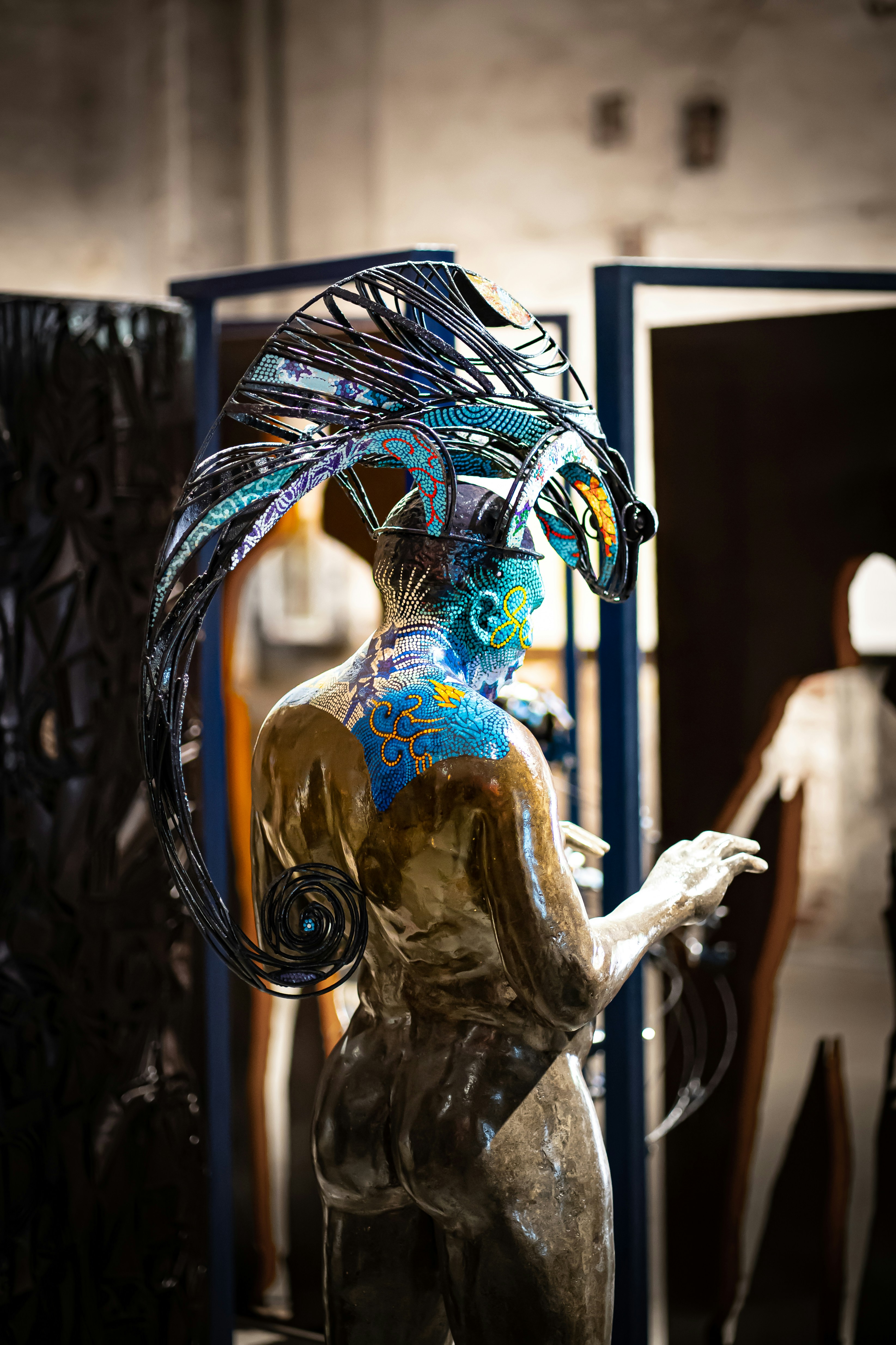 Ceramic Muse: A Shimmering Figure in an Industrial Gallery
