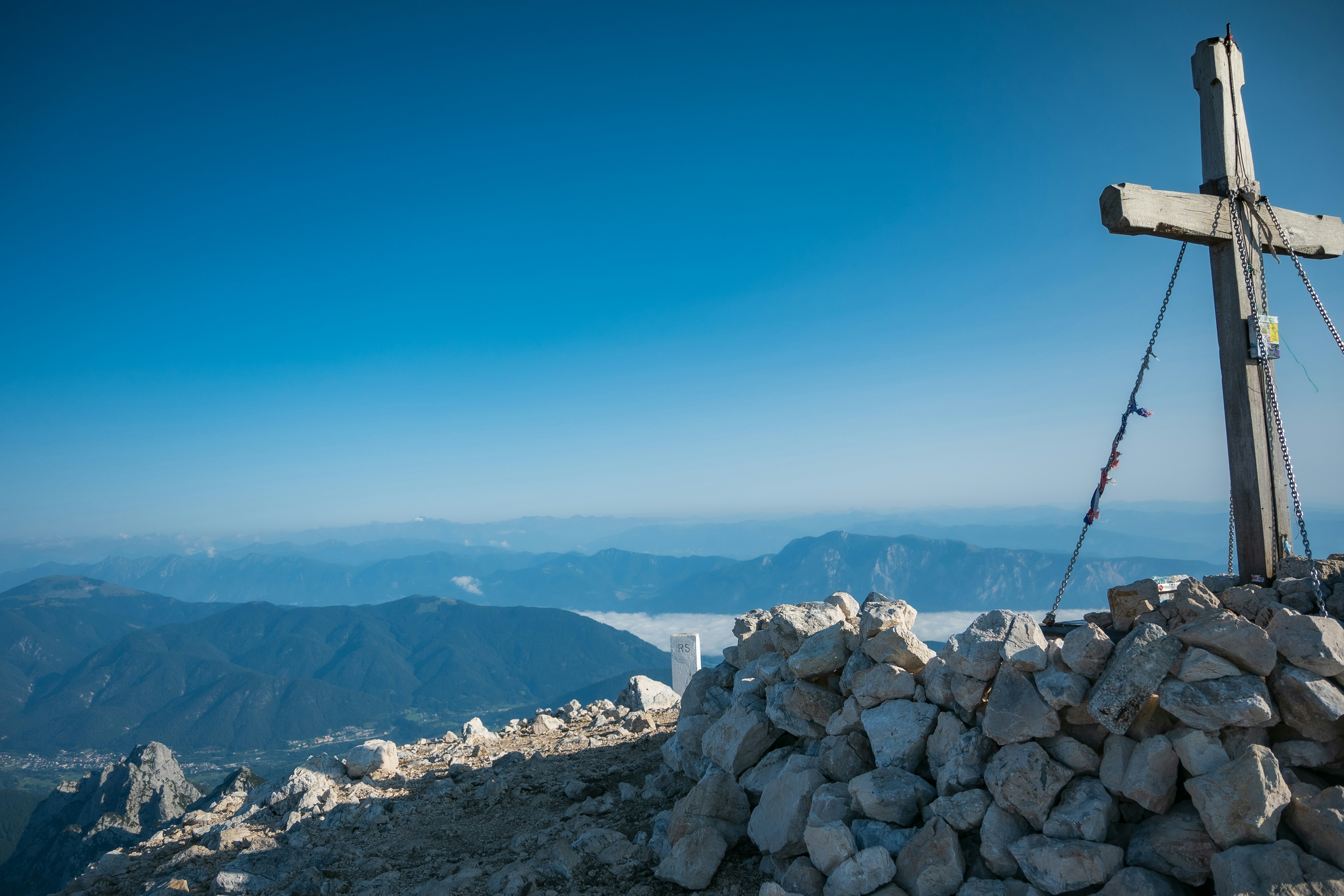 Summit Cross Above the Sea of Peaks