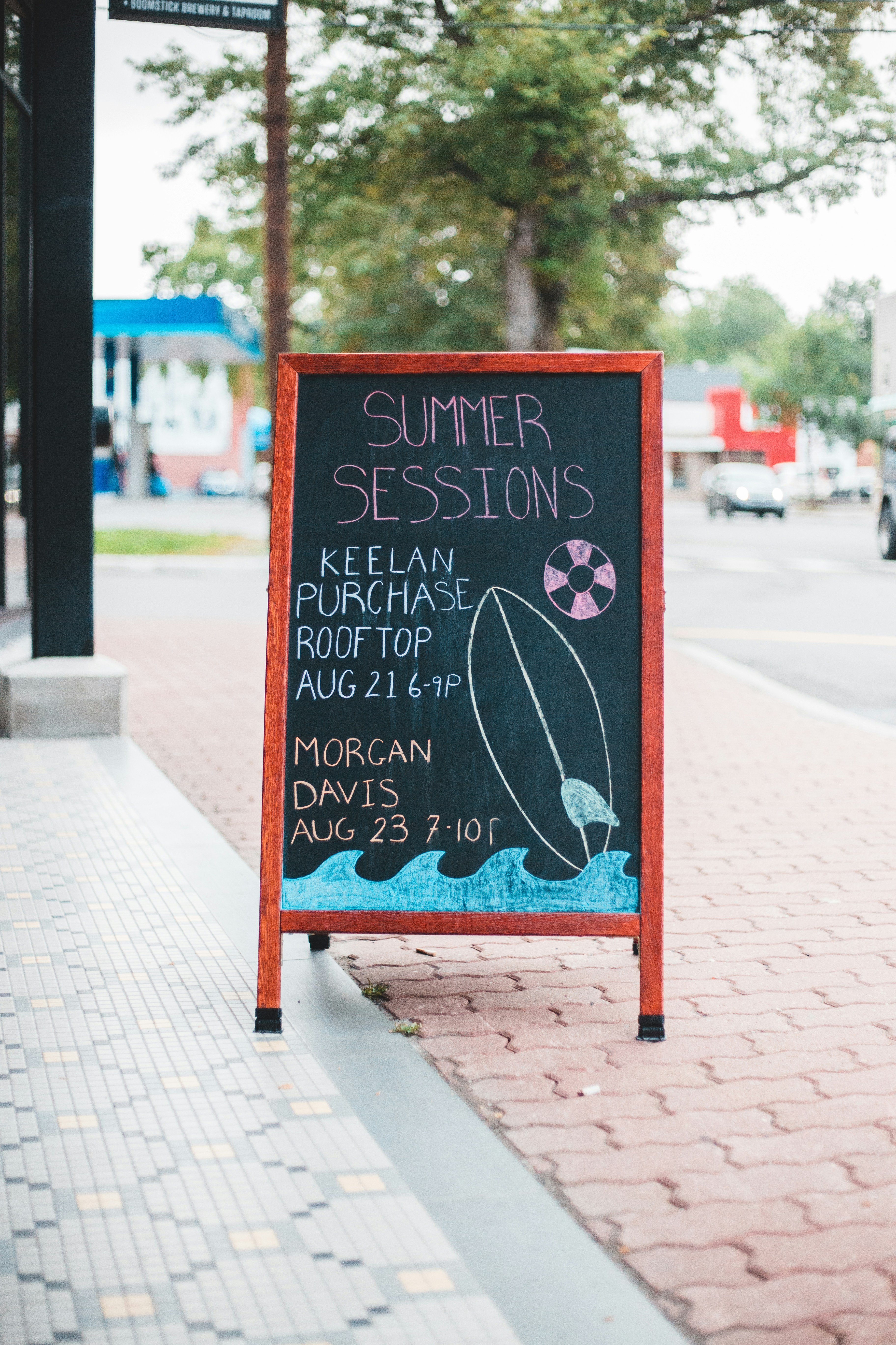 Red and white wooden signage photo – Free Blackboard Image on Unsplash