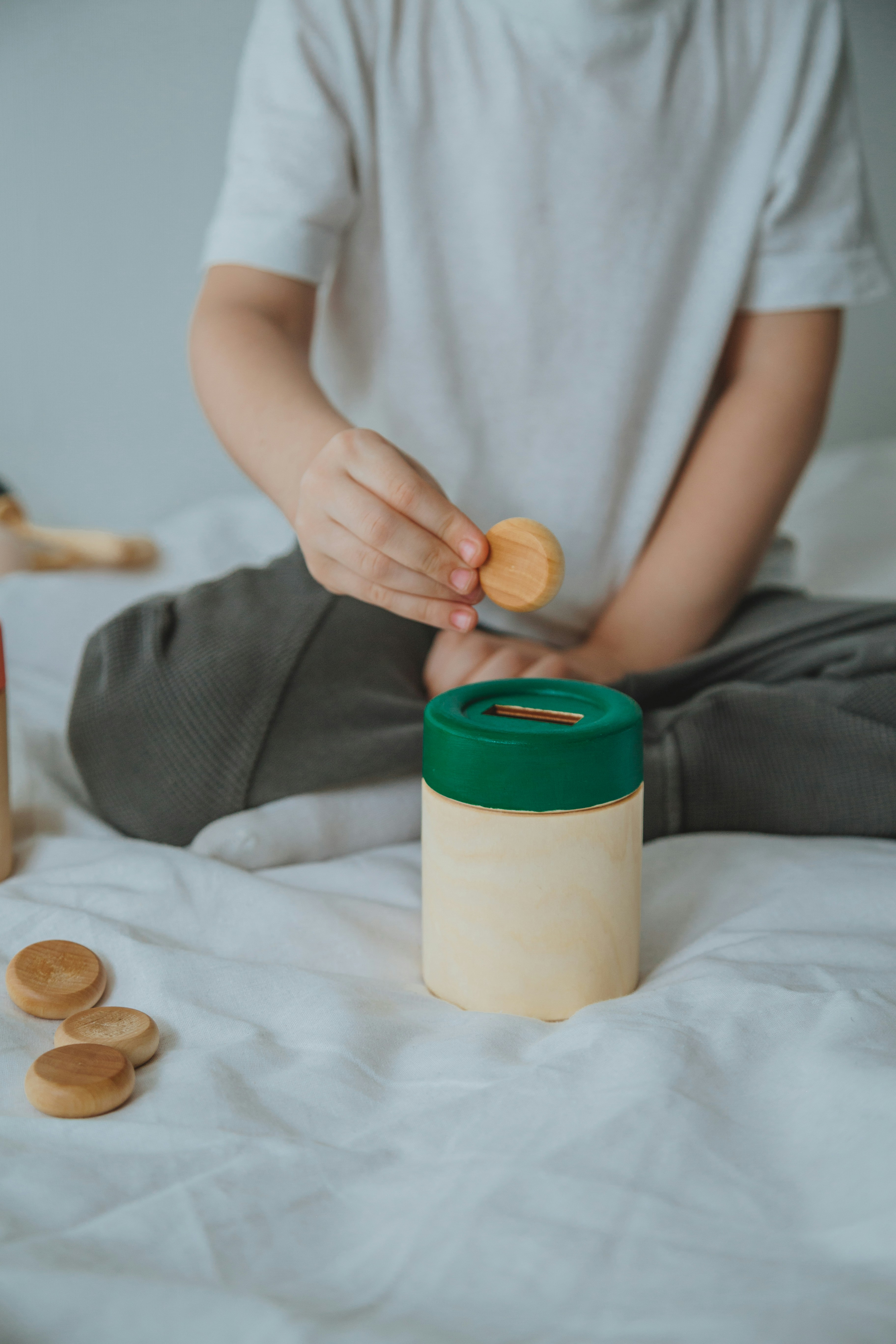 Counting Tokens by the Green-Capped Jar: A Quiet Bedtime Play Moment