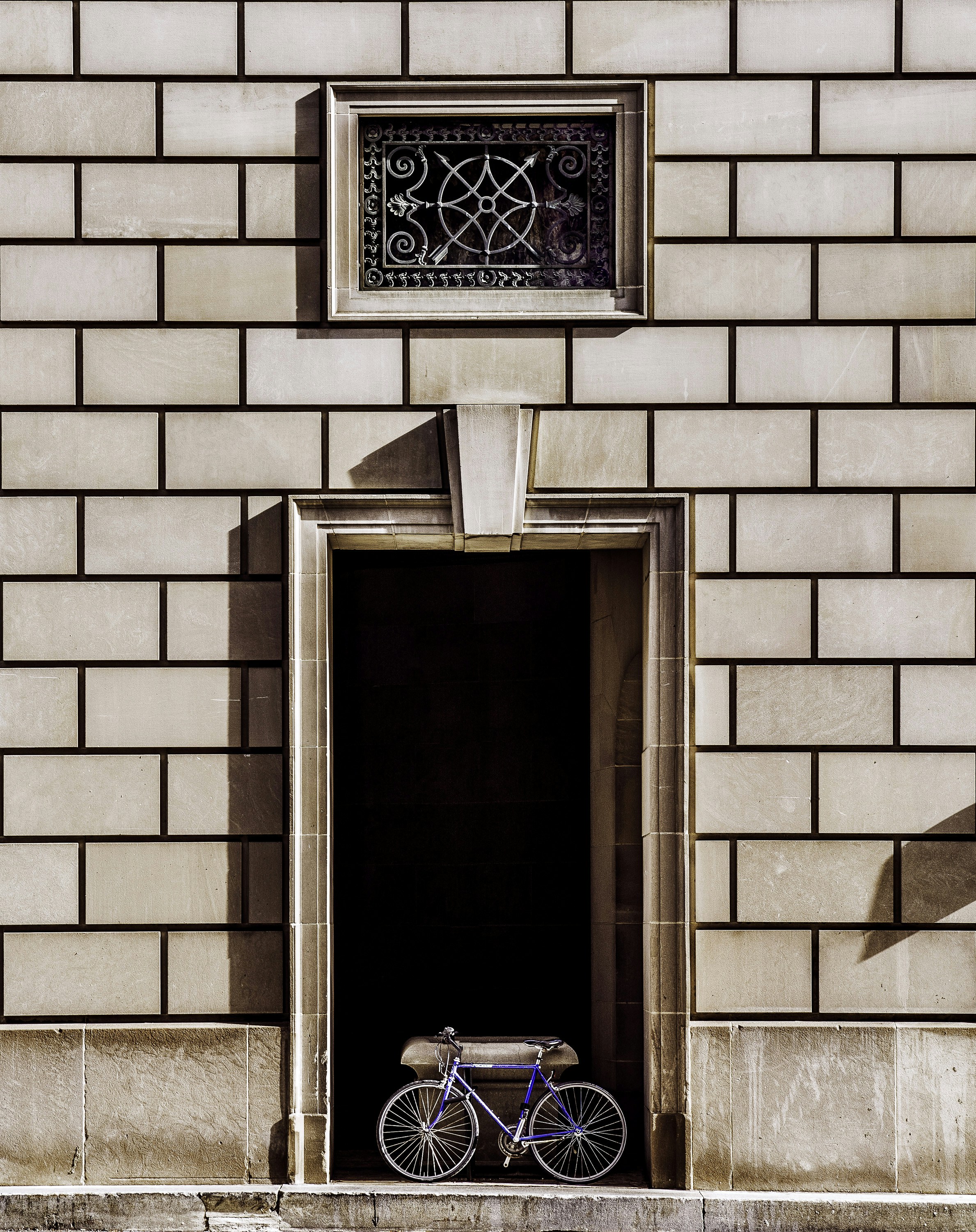 Blue Bicycle at the Brick Threshold: A Quiet Geometry