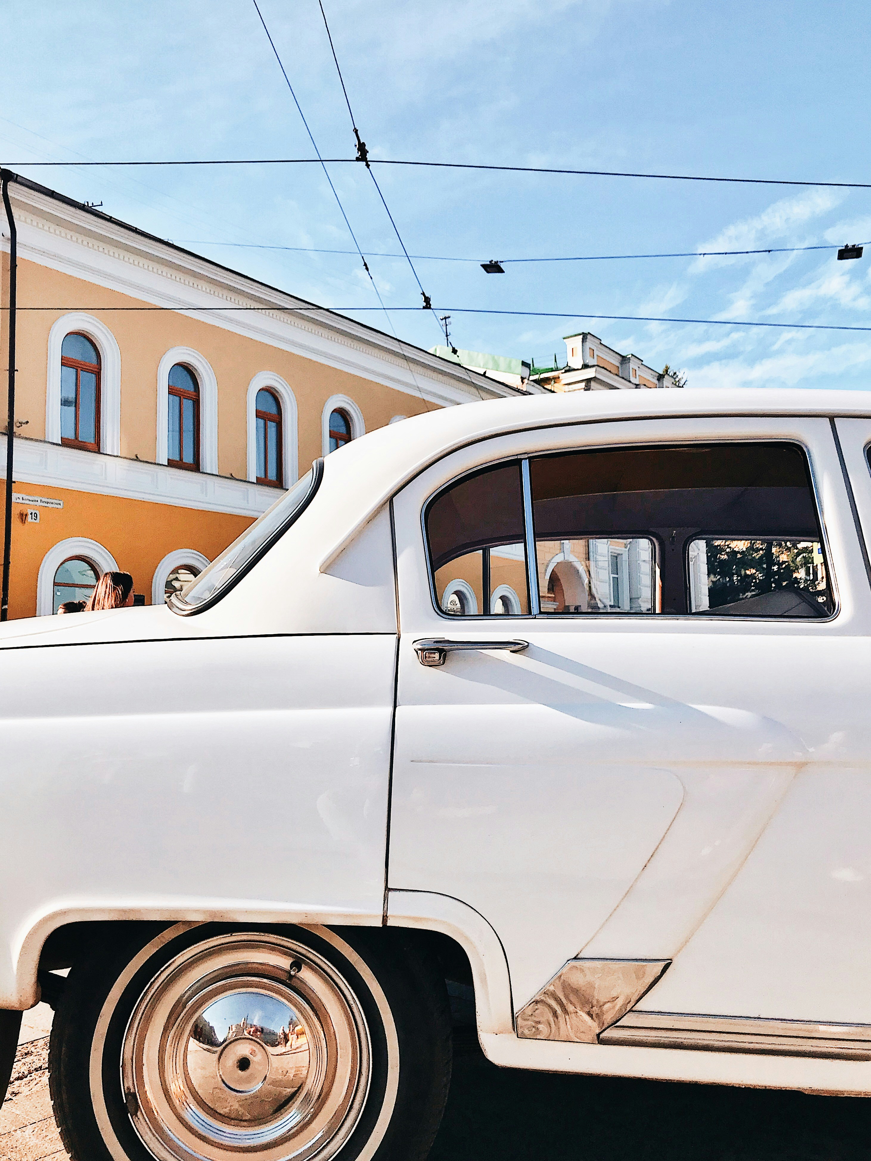 Classic Cruiser in Sunlit Cityscape
