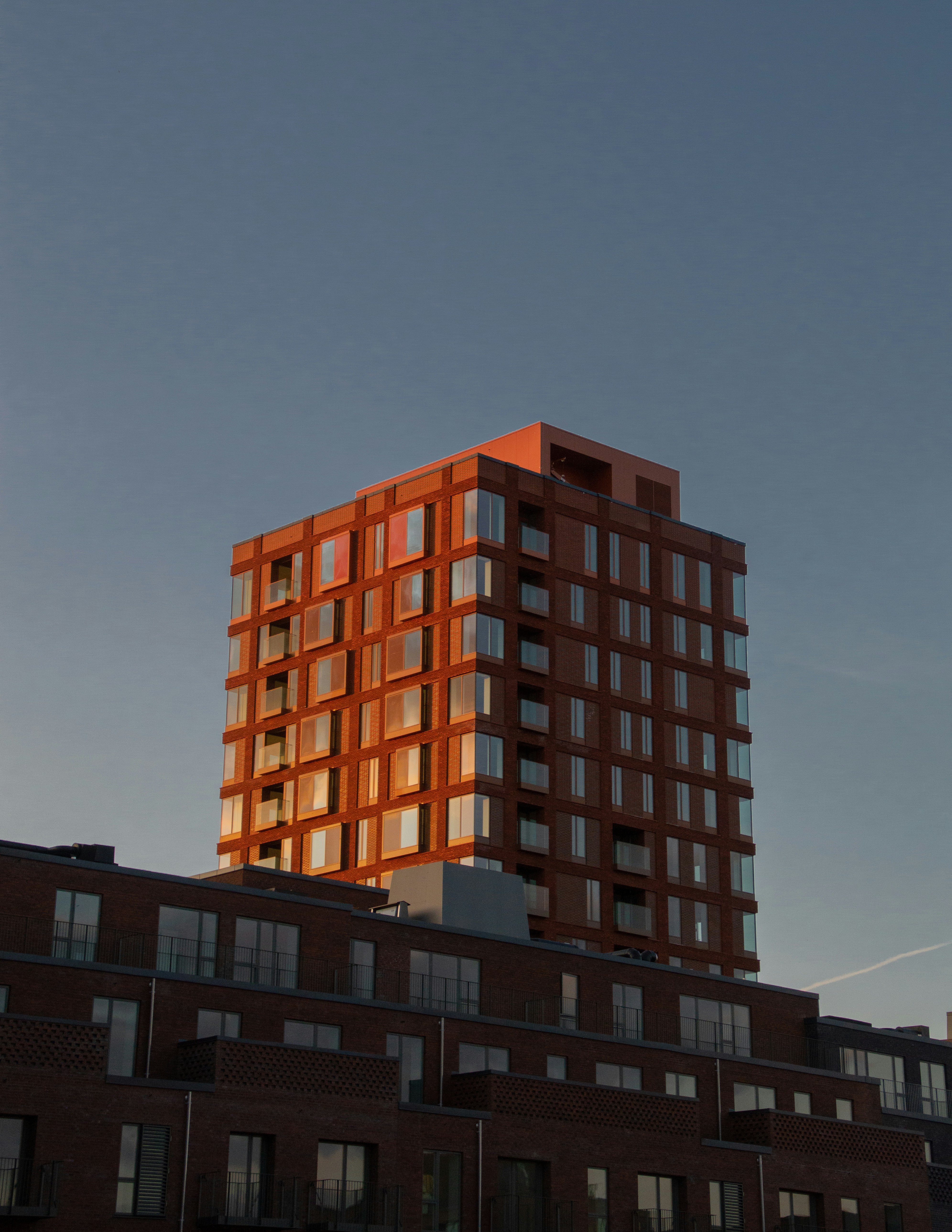 brown concrete building under blue sky during daytime