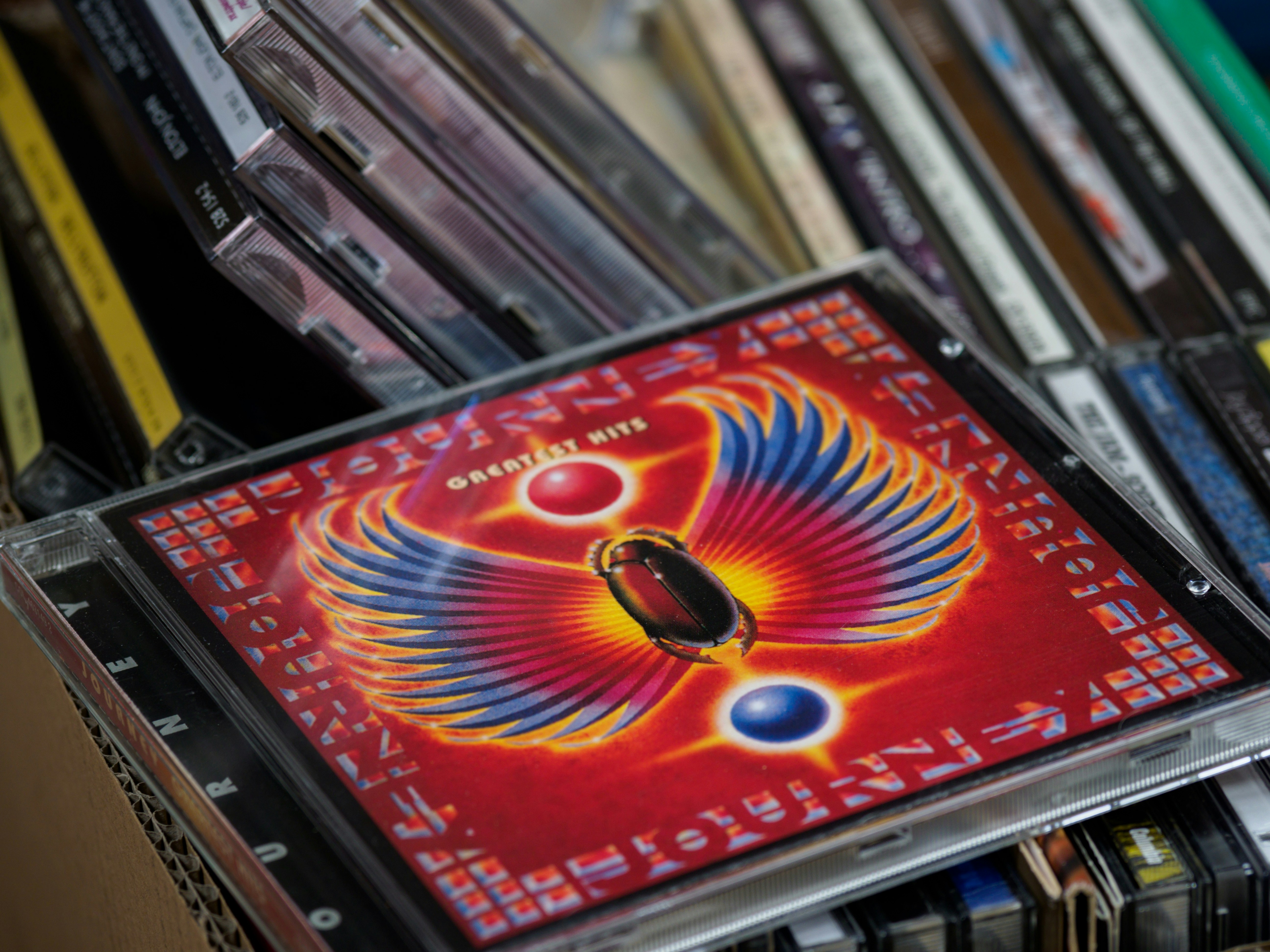 Black and red cd case photo – Free Electronics Image on Unsplash