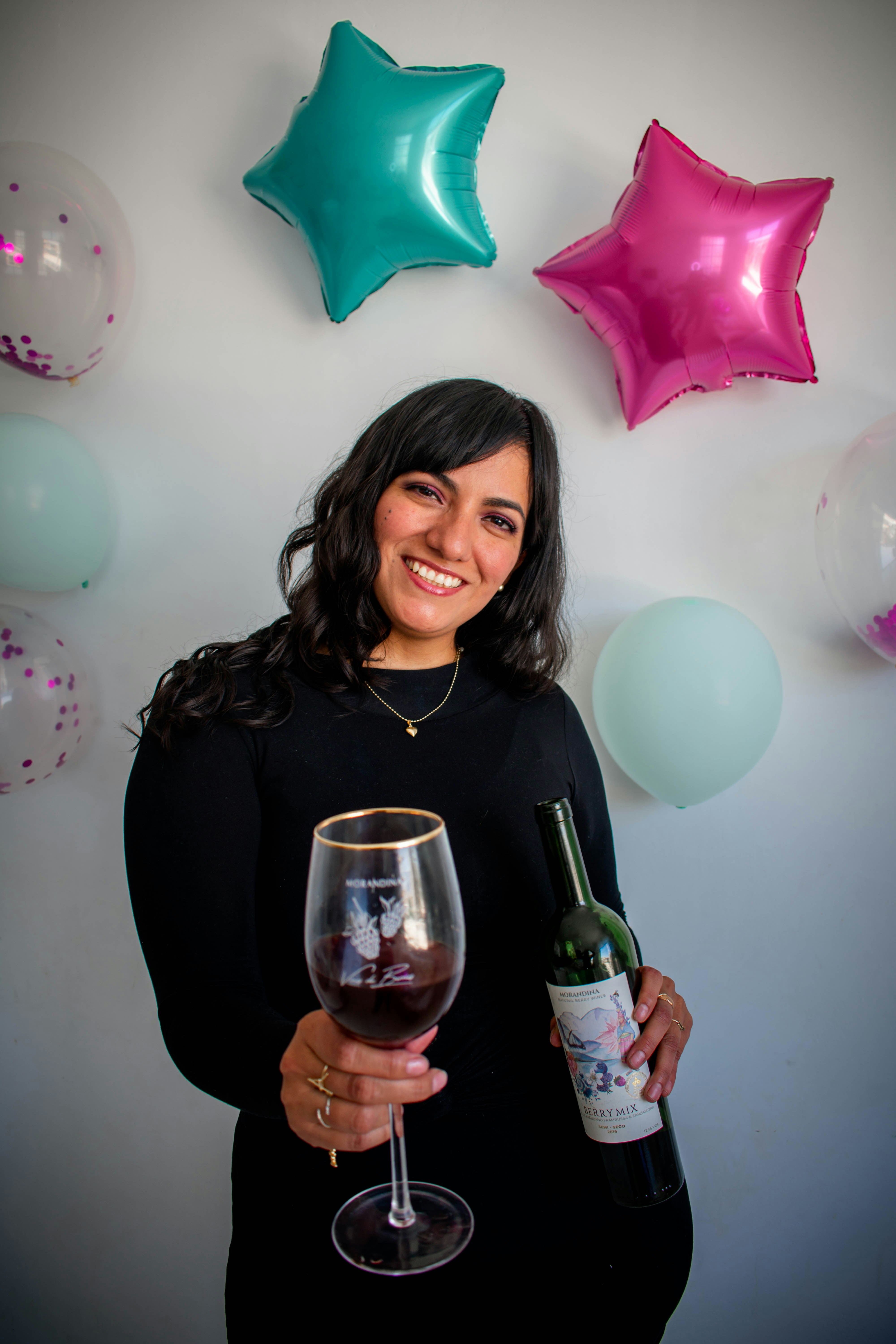 A Bottled Celebration: Portrait with a Glass of Red