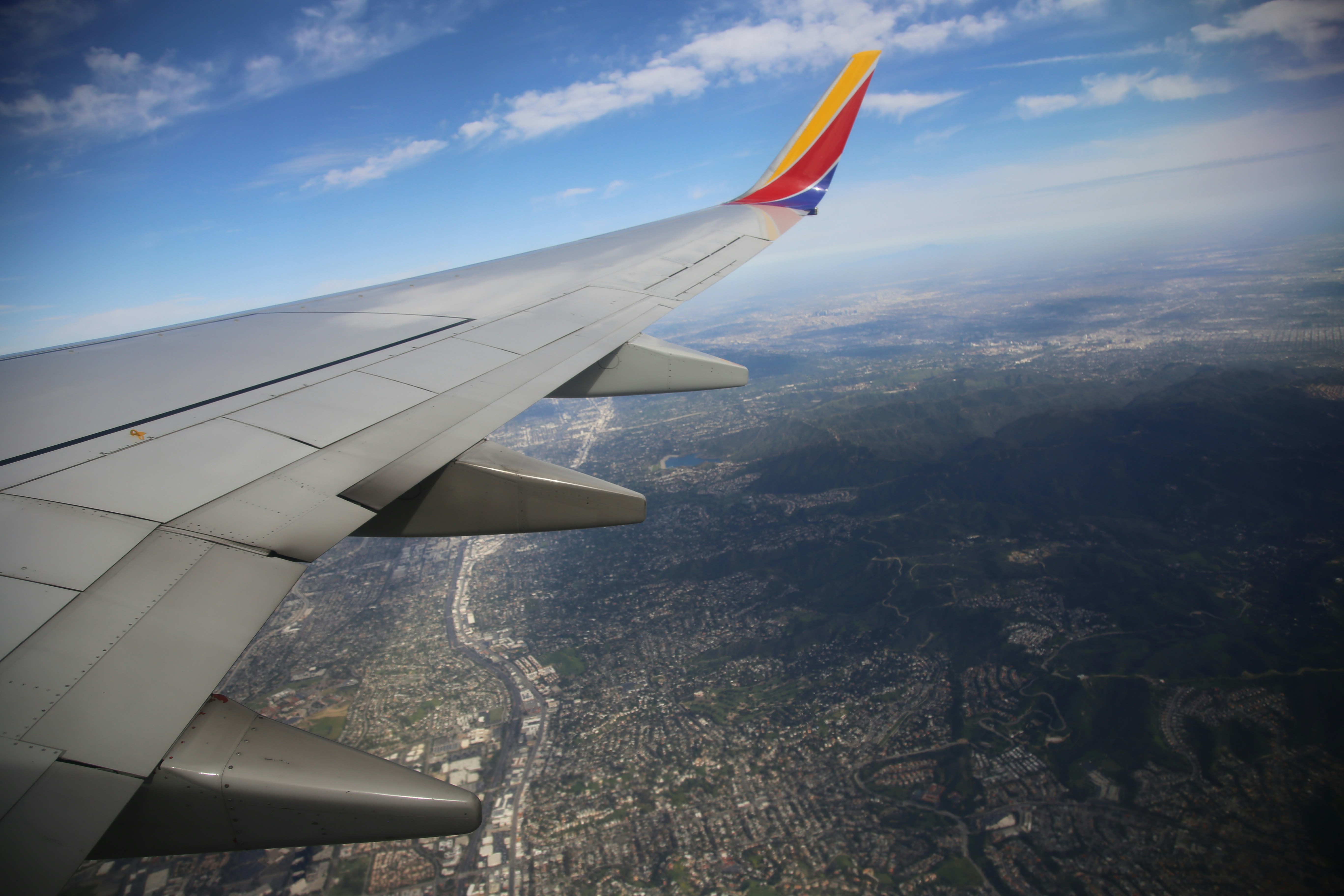 Wingtip Panorama: Aerial View Over a Quiet City