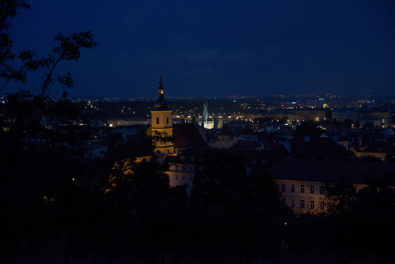 Moonlit Belfry Over a Quiet Hilltop City