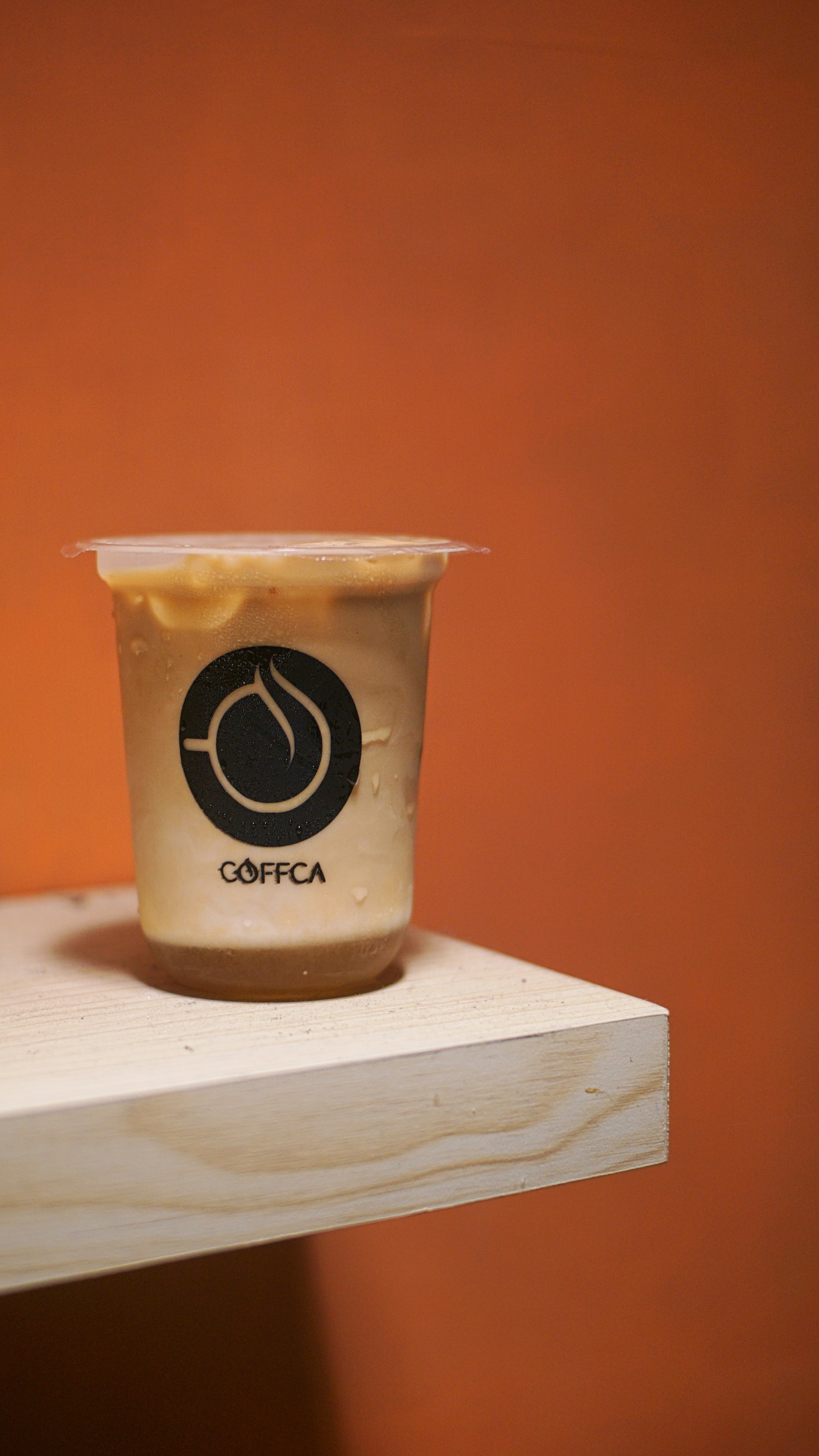 Amber Quiet: Iced Coffee on a Pine Shelf