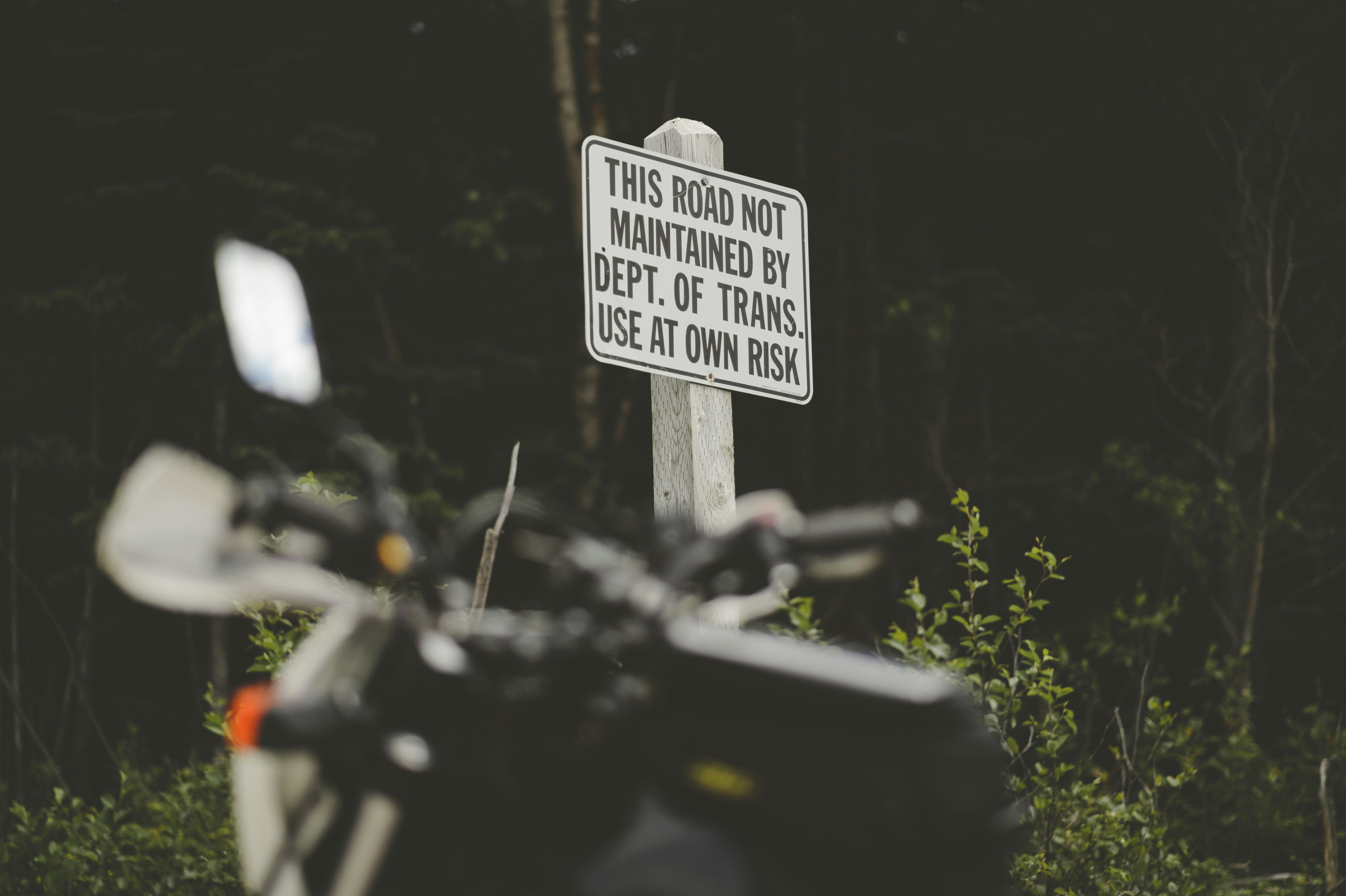 White and black road sign photo – Free Symbol Image on Unsplash