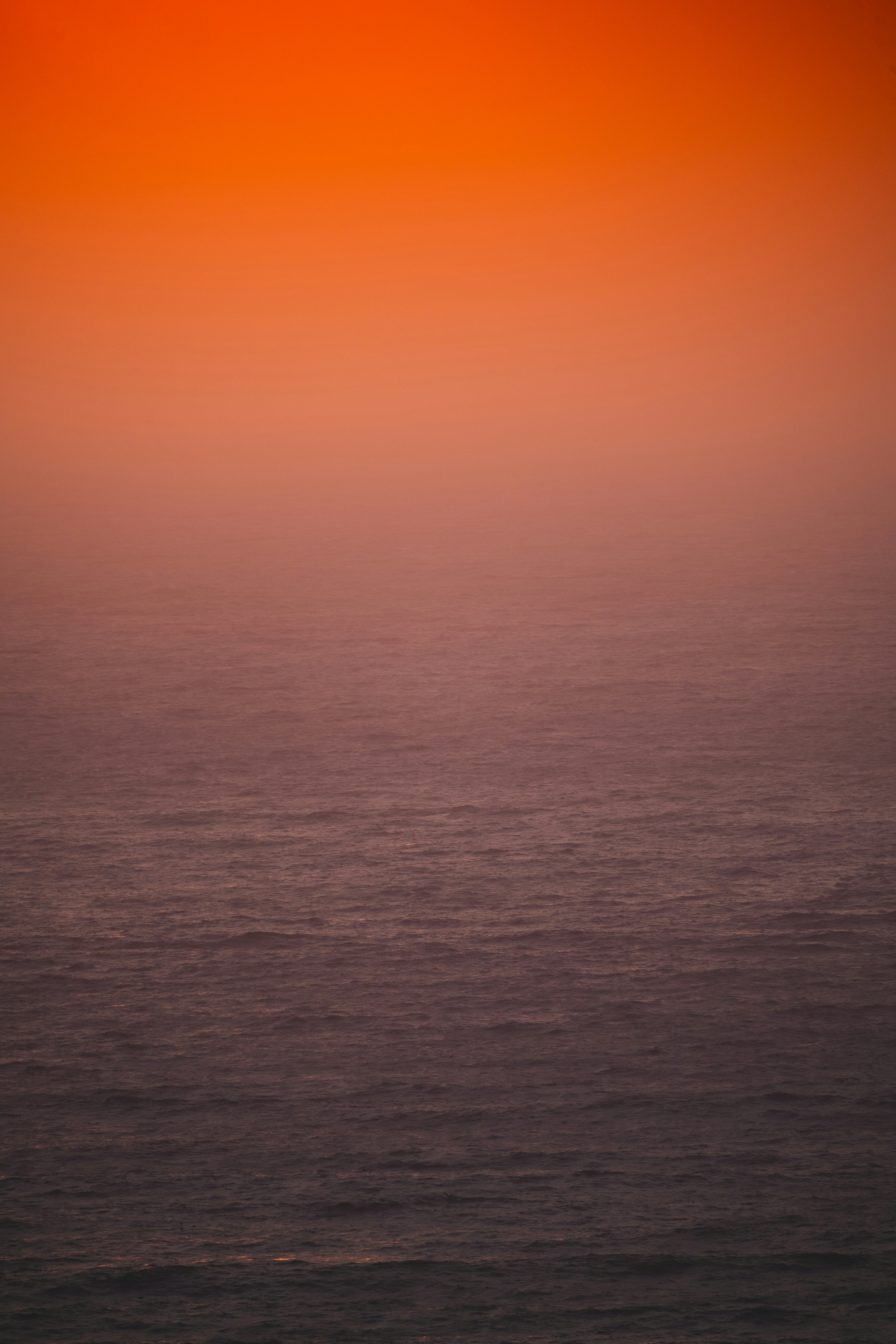 Crimson Dusk Drapes the Velvet Sea
