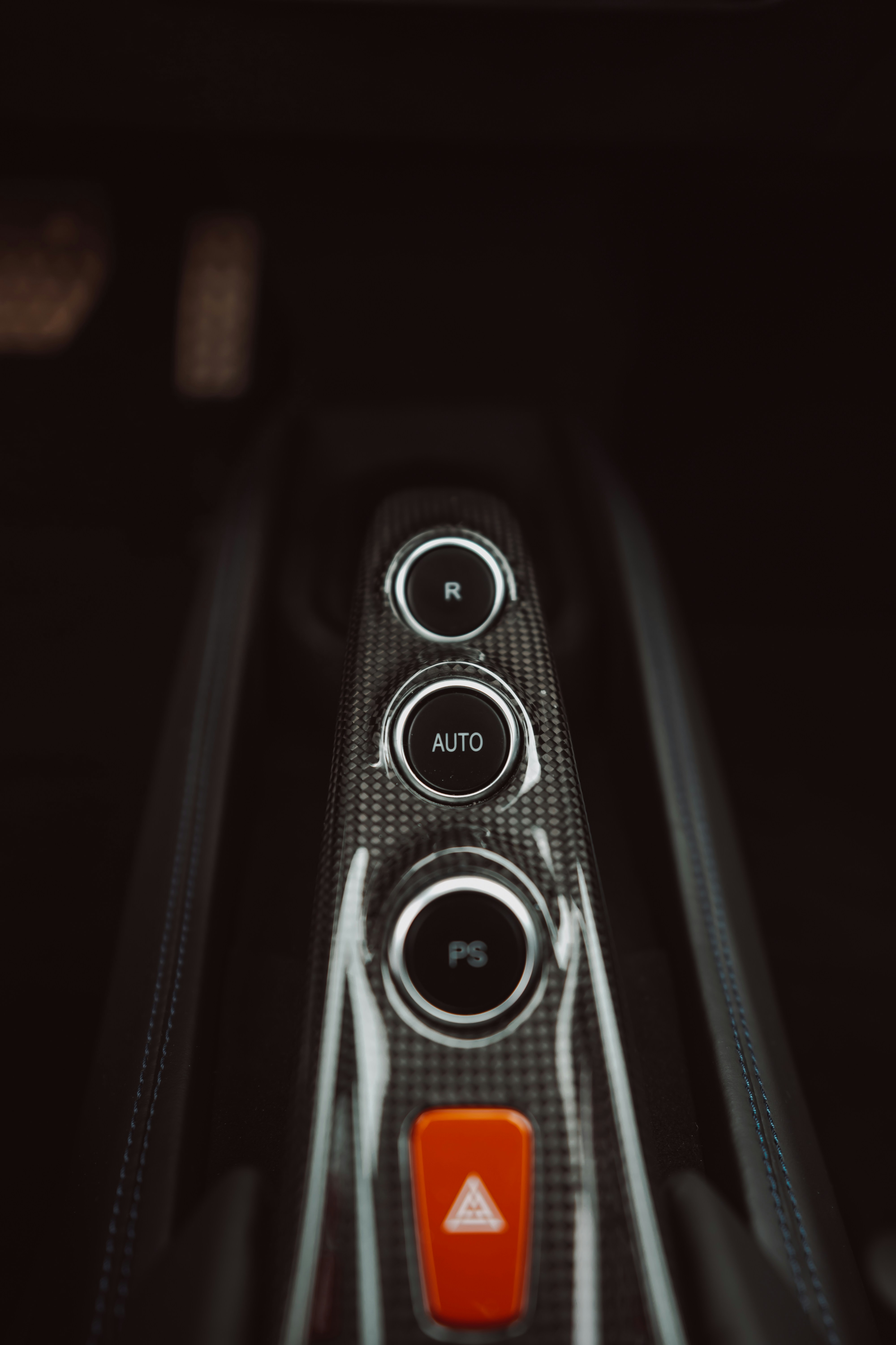 Trio of Drive-Mode Circles on a Carbon-Fiber Center Console