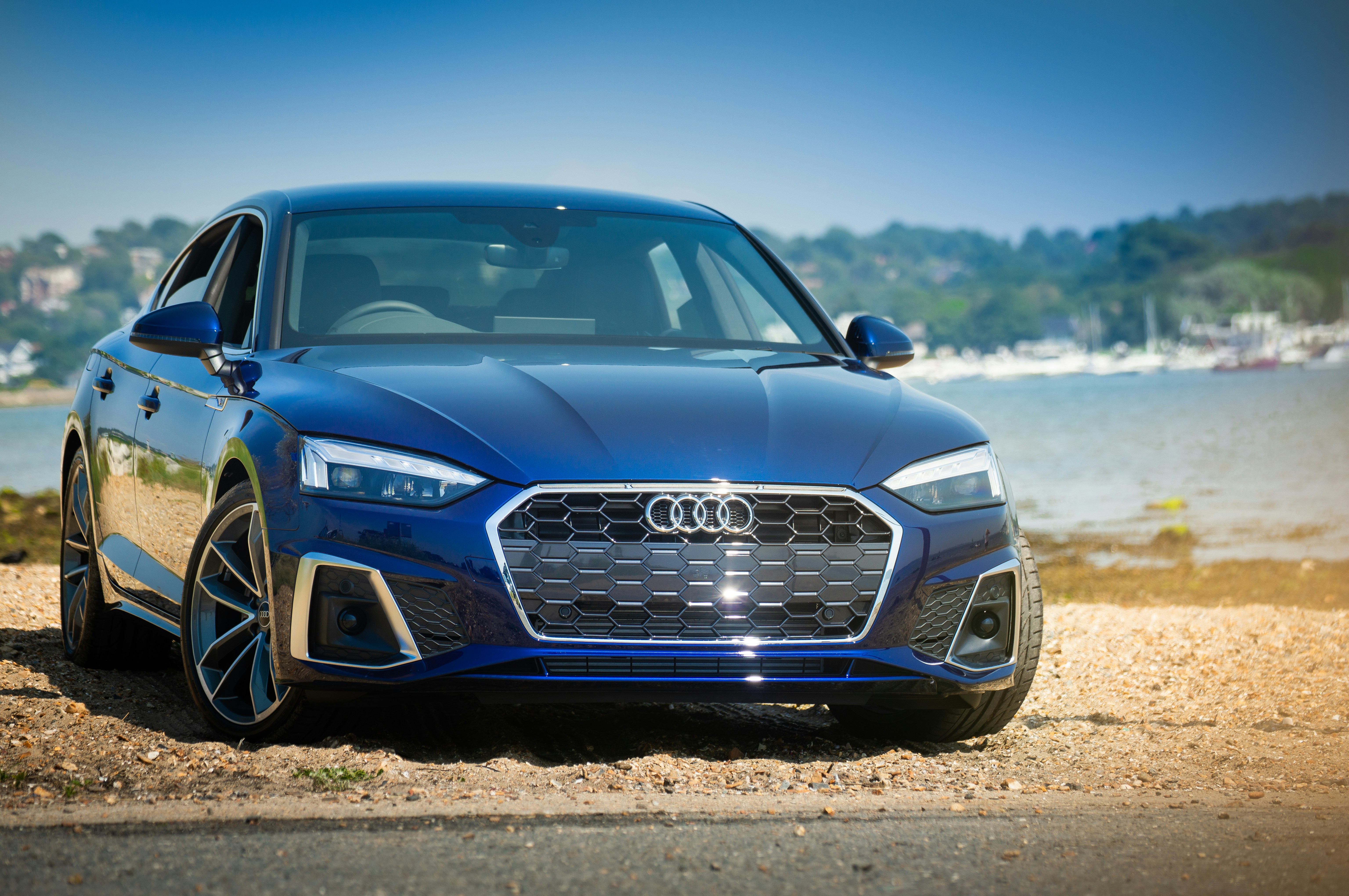 Blue audi car on gray sand during daytime photo – Free Audi a5 ...