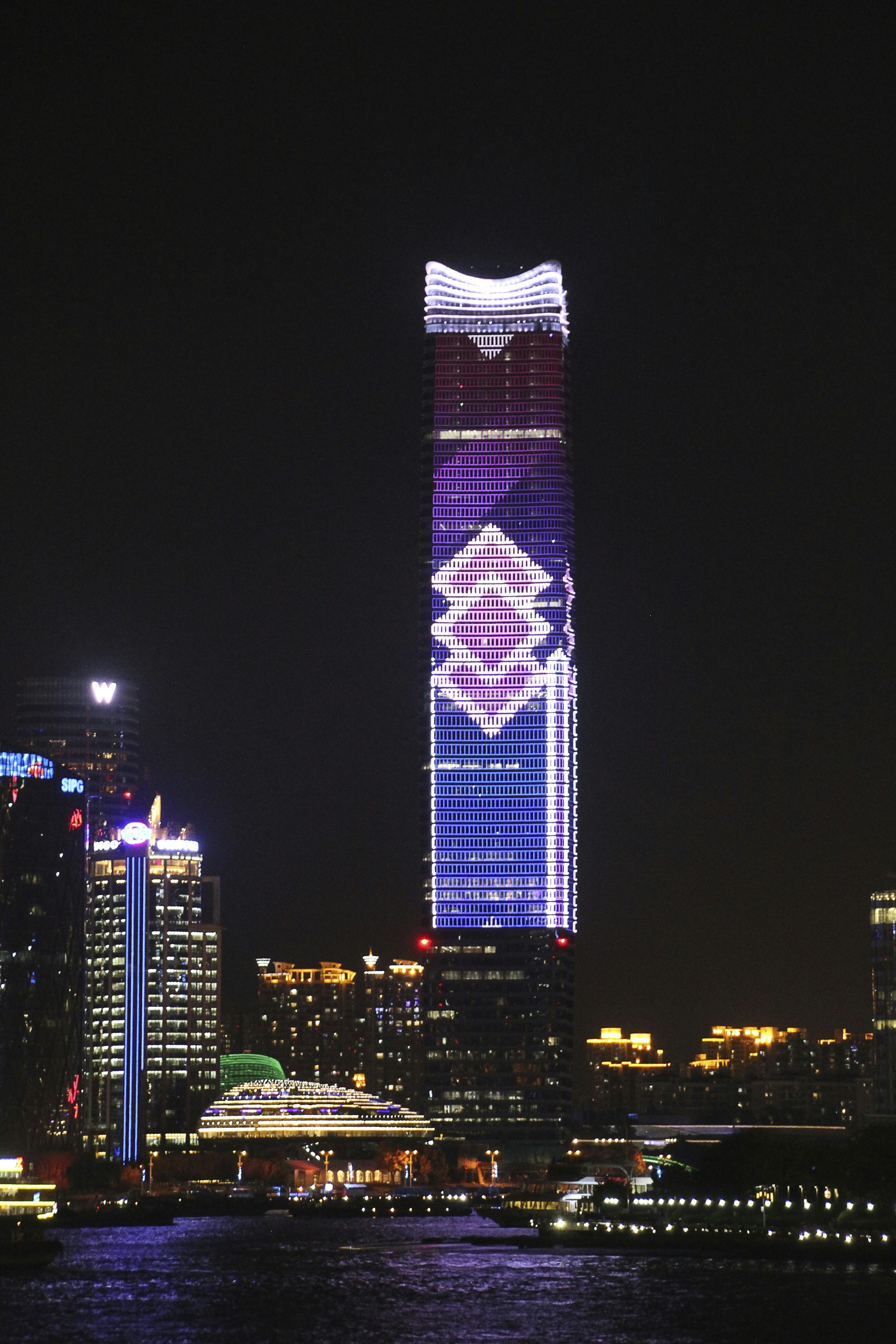 Diamond Beacon Over the Night Skyline