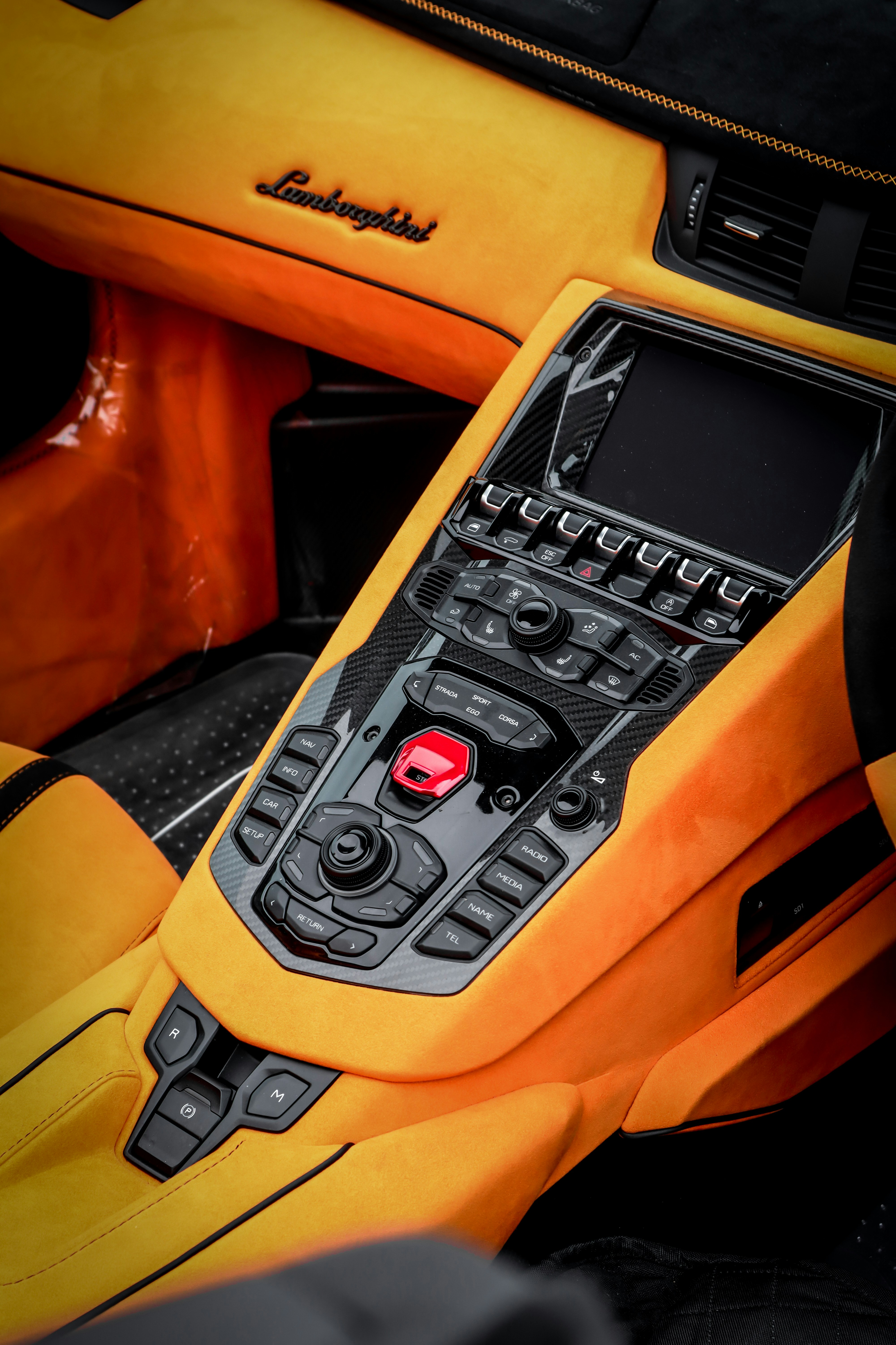 Orange cockpit: interior of a Lamborghini supercar