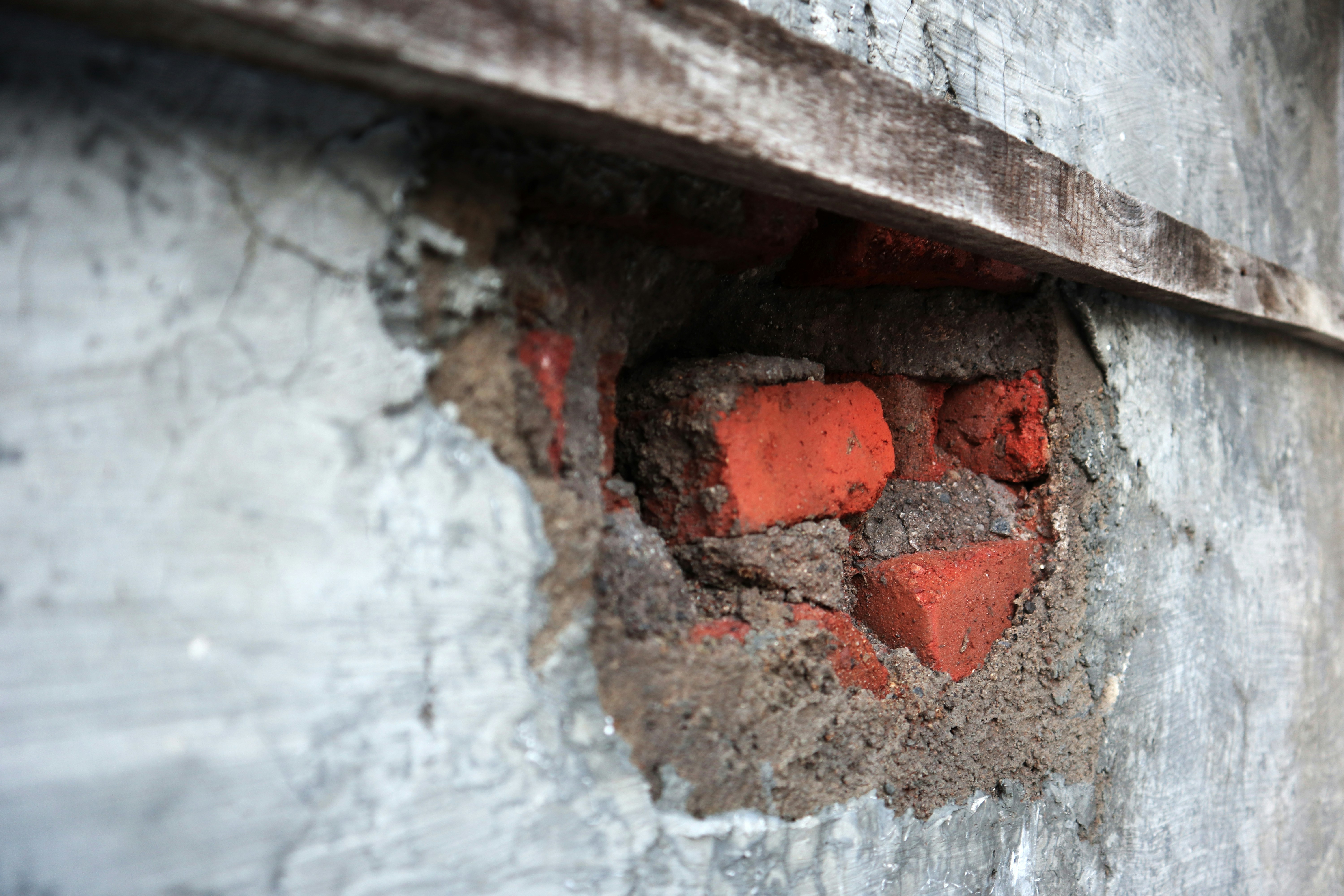 Cracked Red Bricks in Concrete Sled of Decay