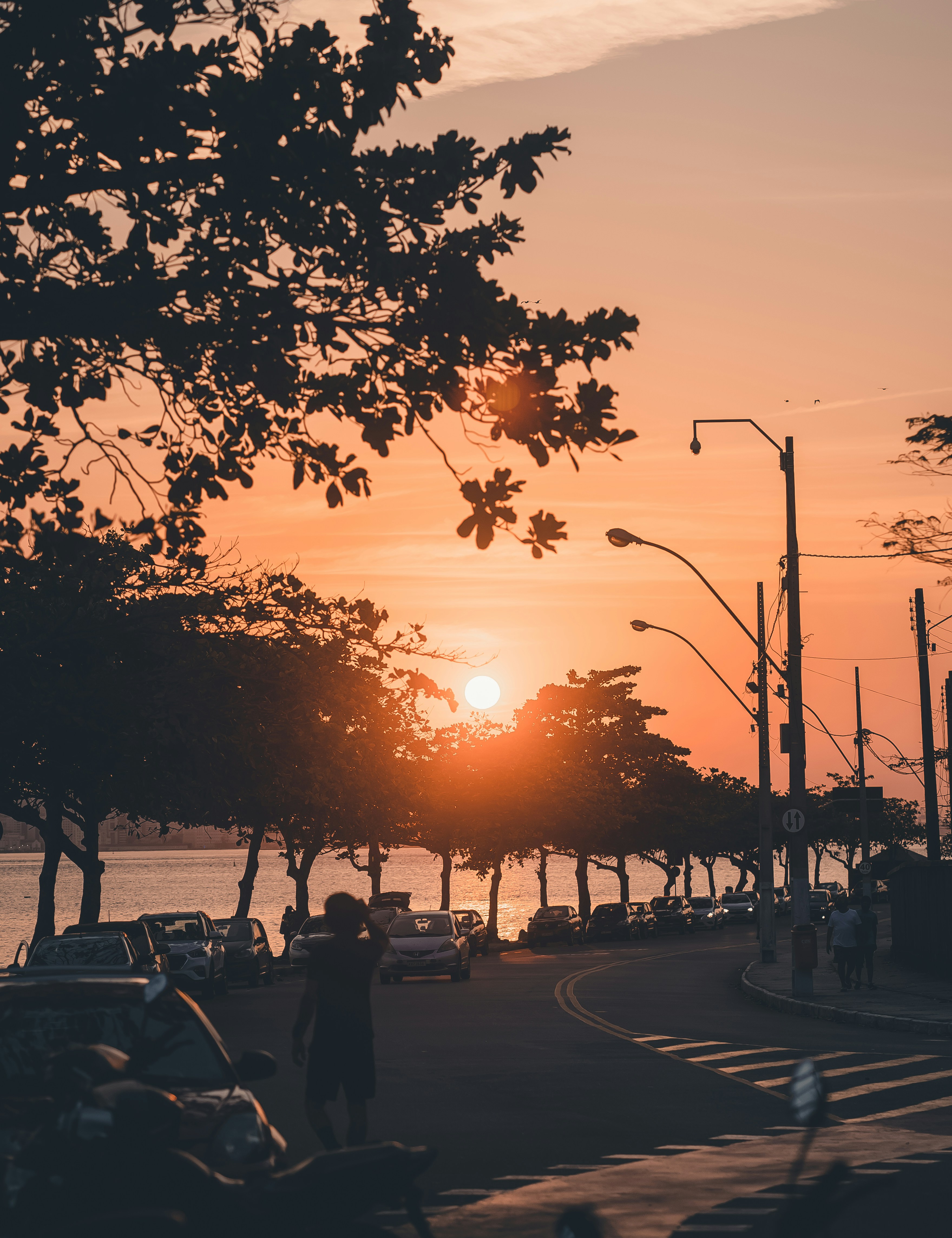 People walking on sidewalk during sunset photo – Free Sunset Image on ...