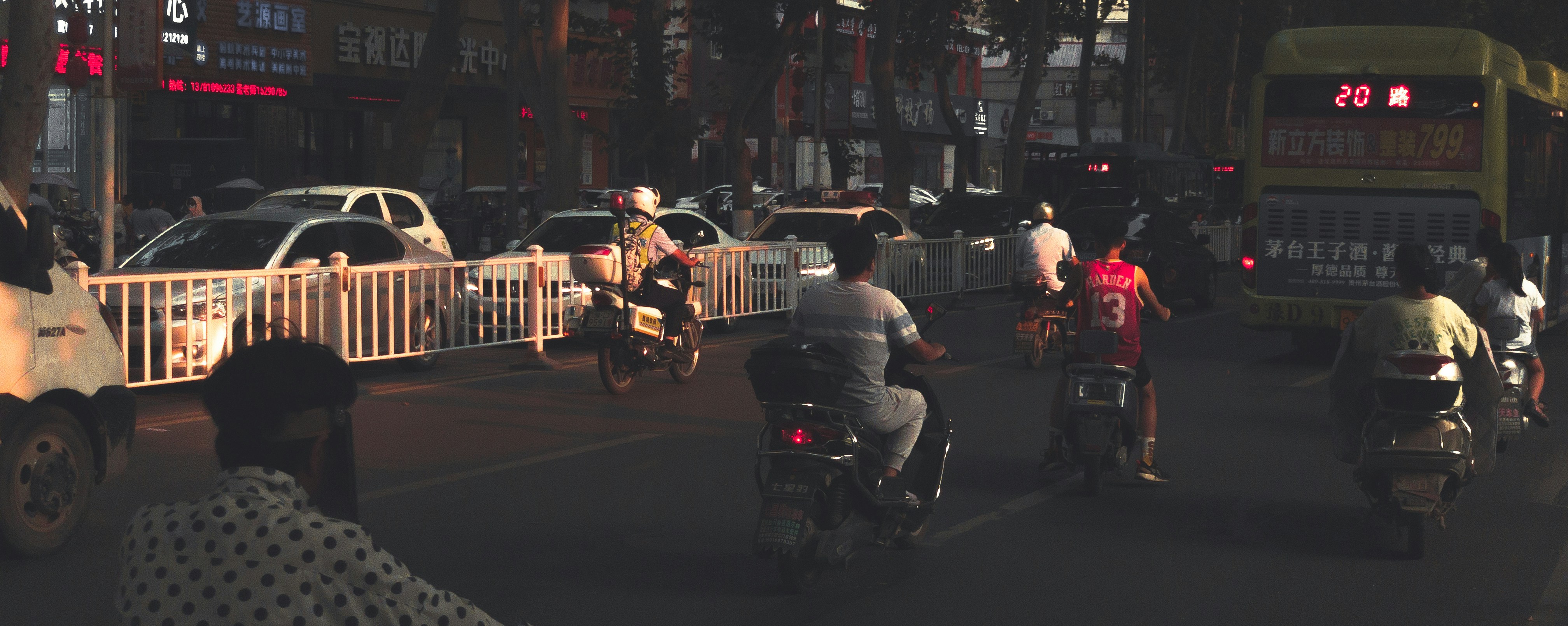 Neon Rush: Motorbikes Weaving Through a City Night