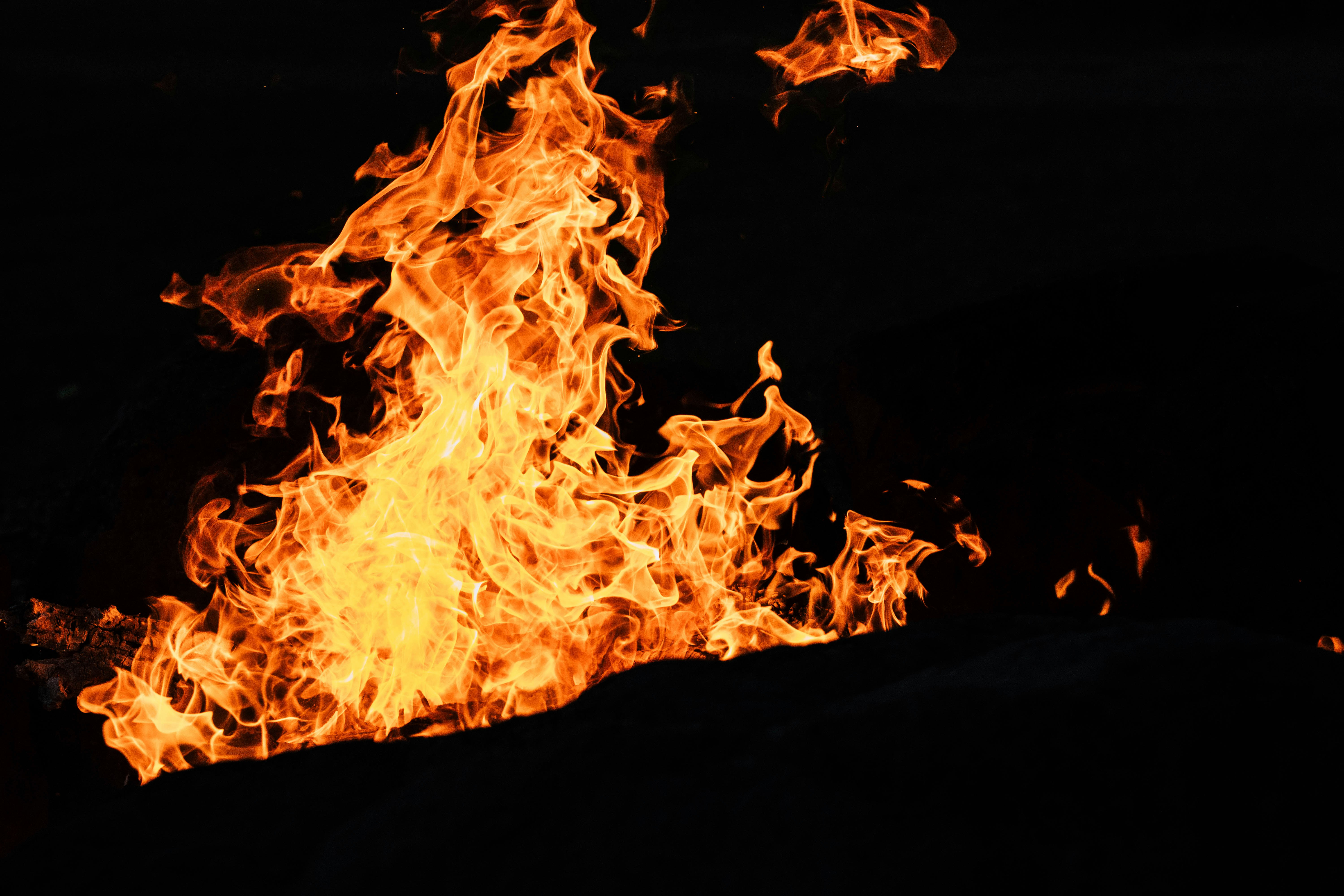 A close up of a fire in the dark photo – Free Fire Image on Unsplash