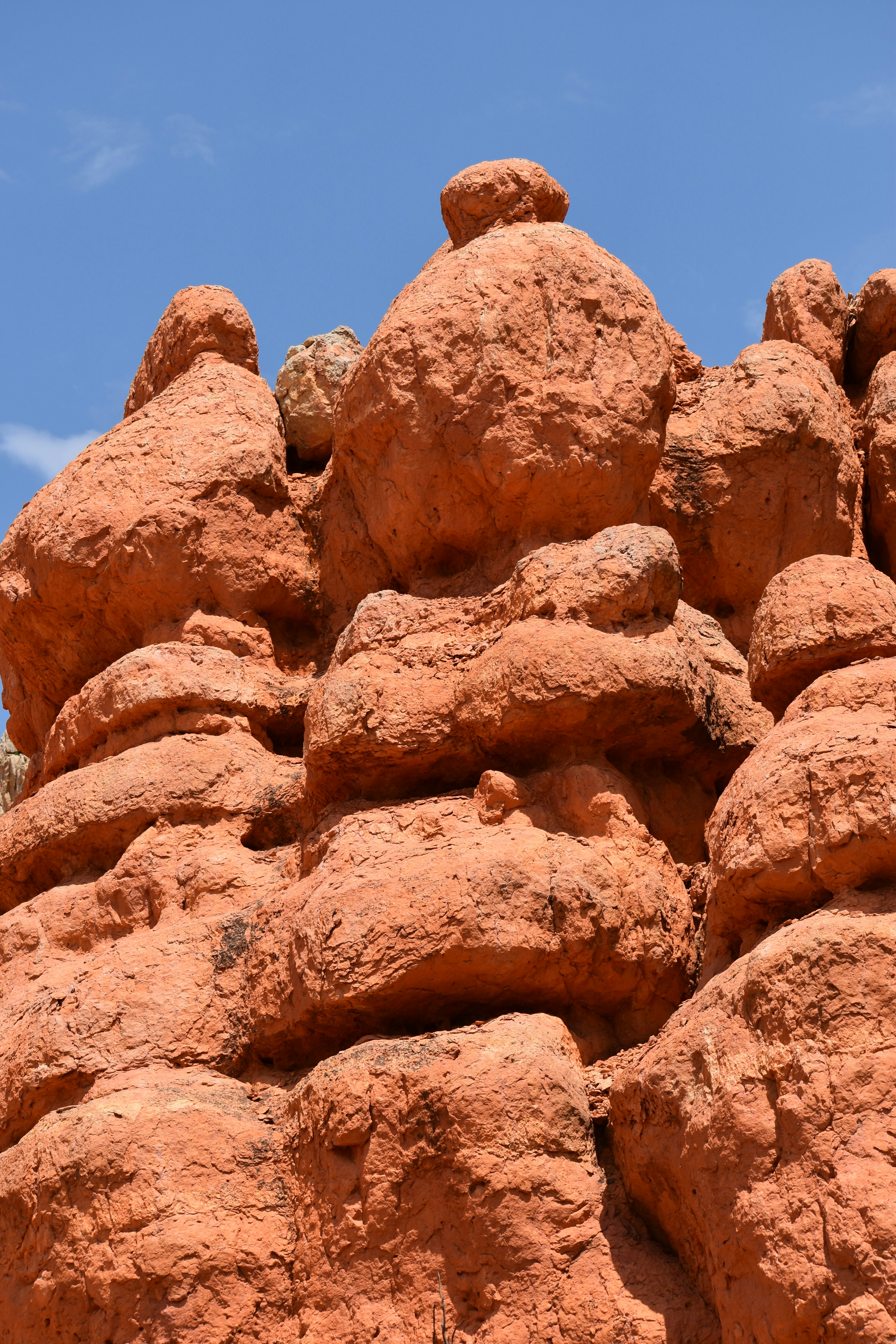 brown rock formation under blue sky during daytime