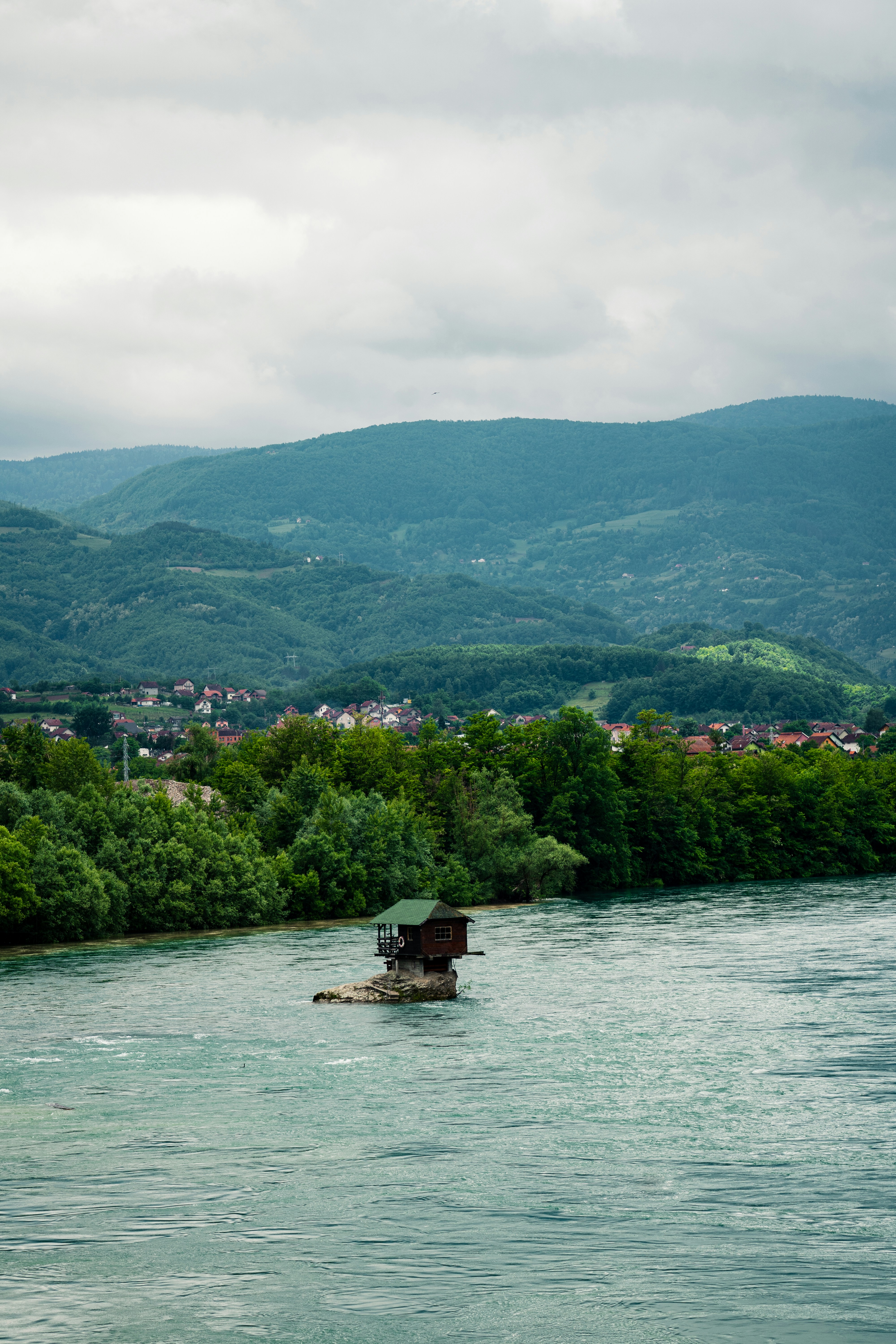 House on the River, Between Green Hills