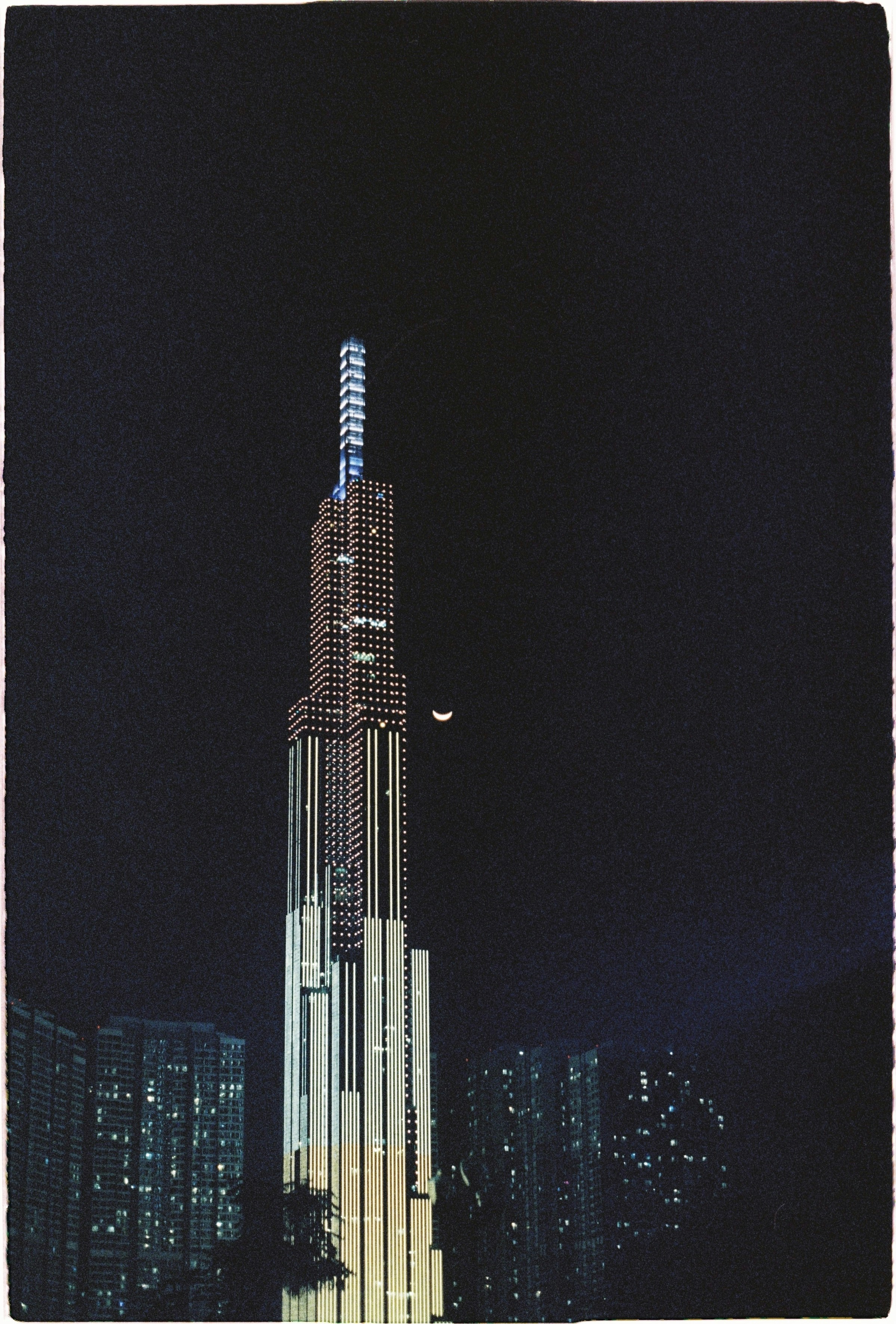Midnight Spire: Neon Lattice Crowned by a Crescent