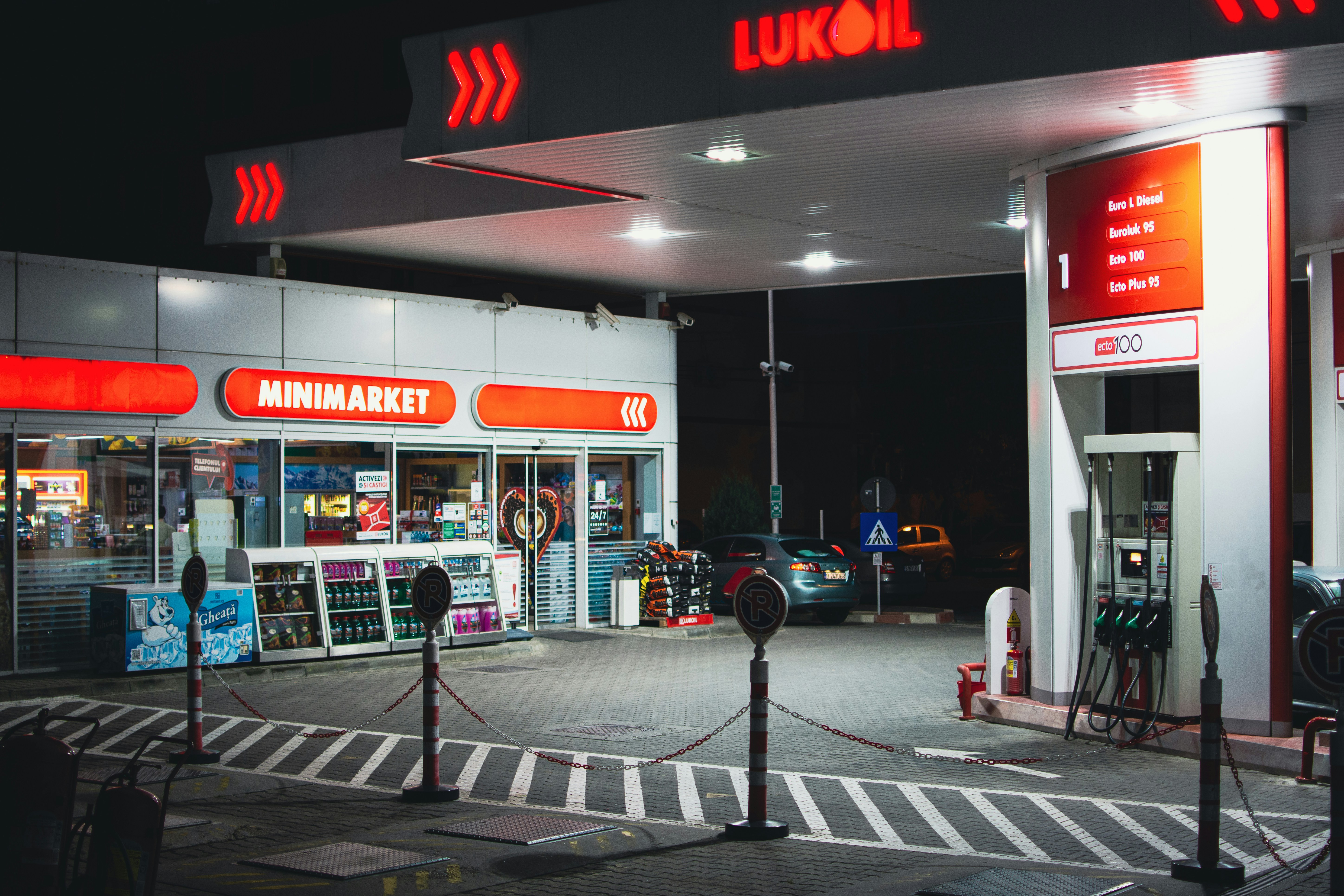 Midnight Pit Stop: Neon Glow Over the Minimarket at a Quiet Gas Station