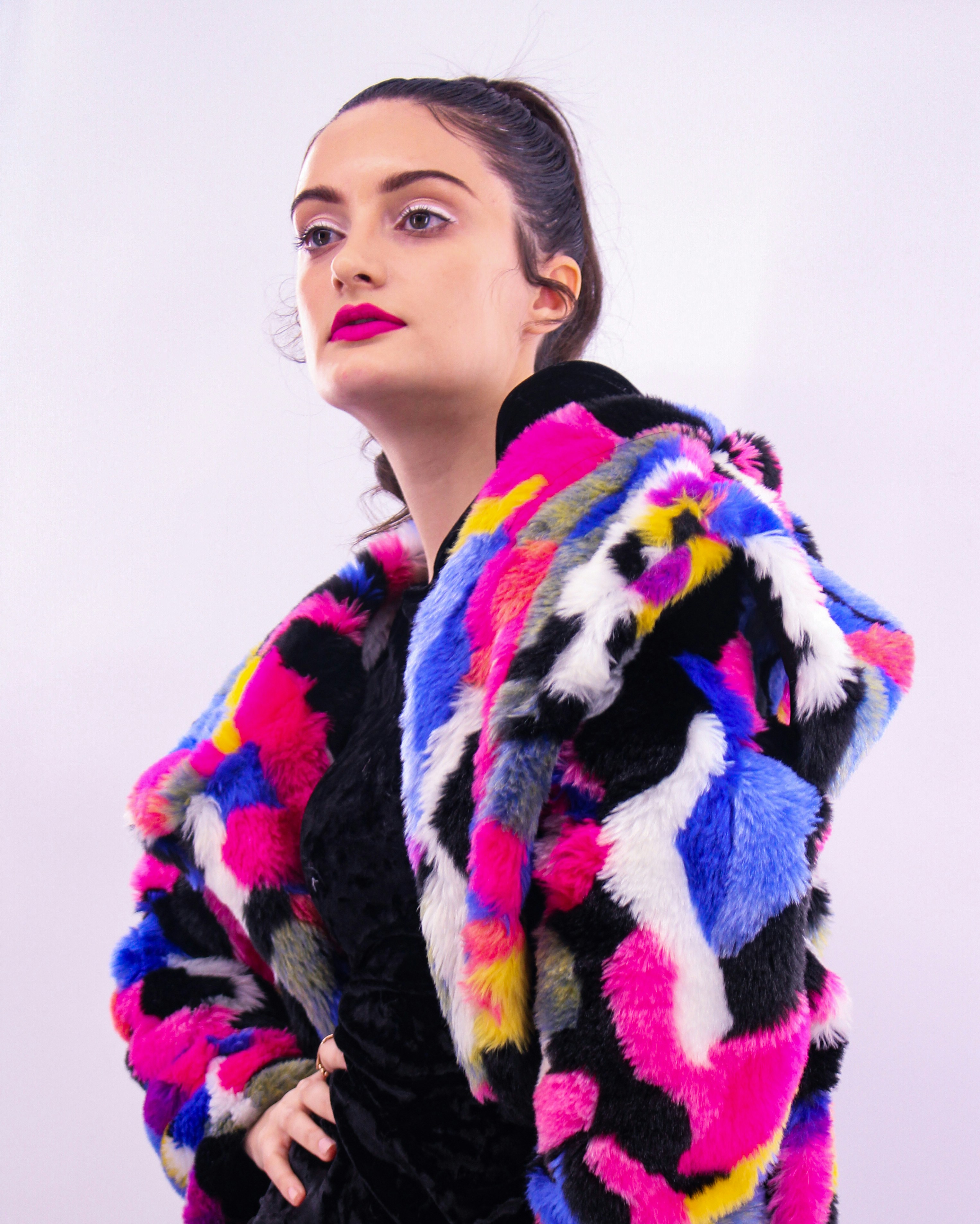 Vivid Spotlight: Portrait in a Color-Block Fur
