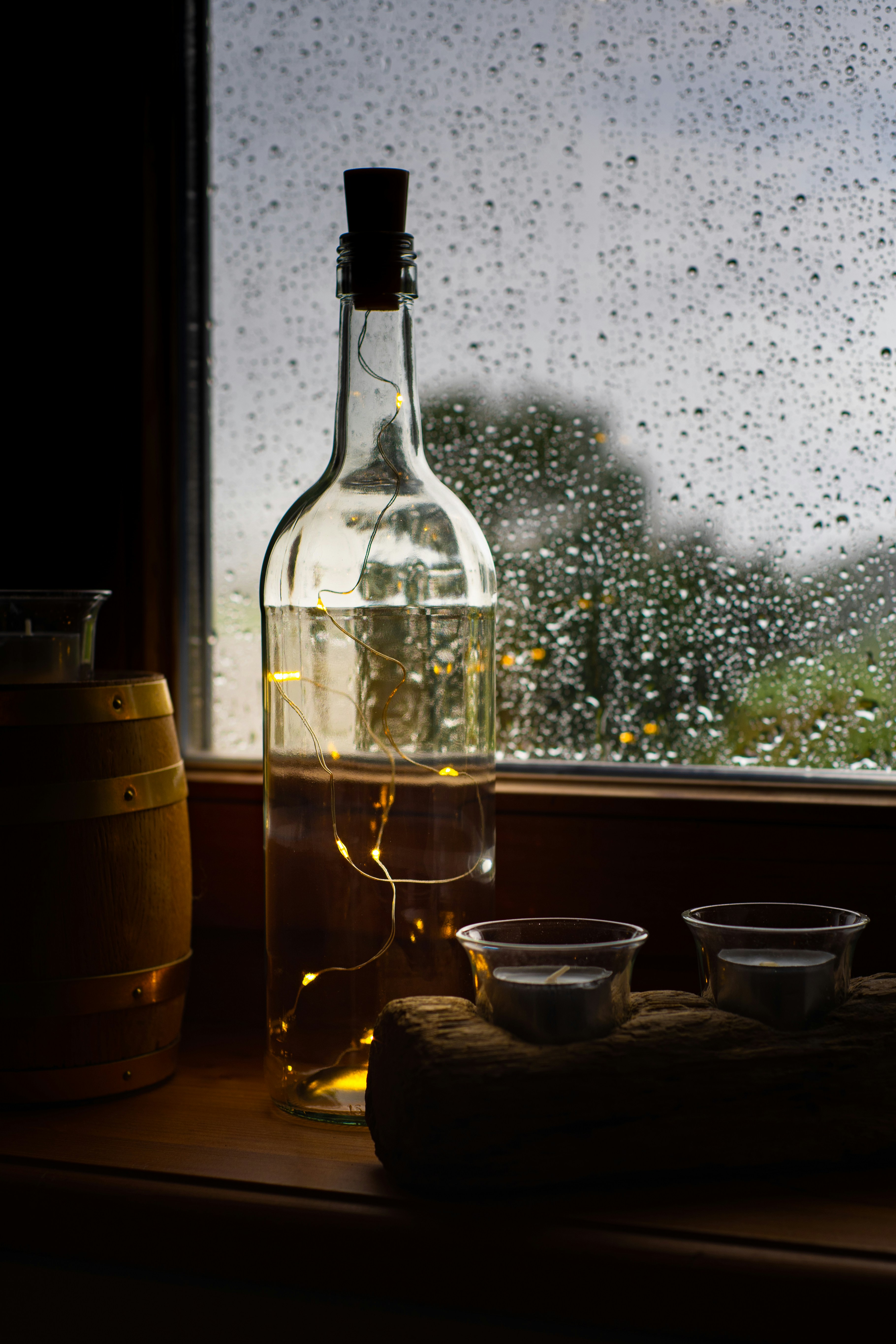 Warm glow in a rain-kissed window