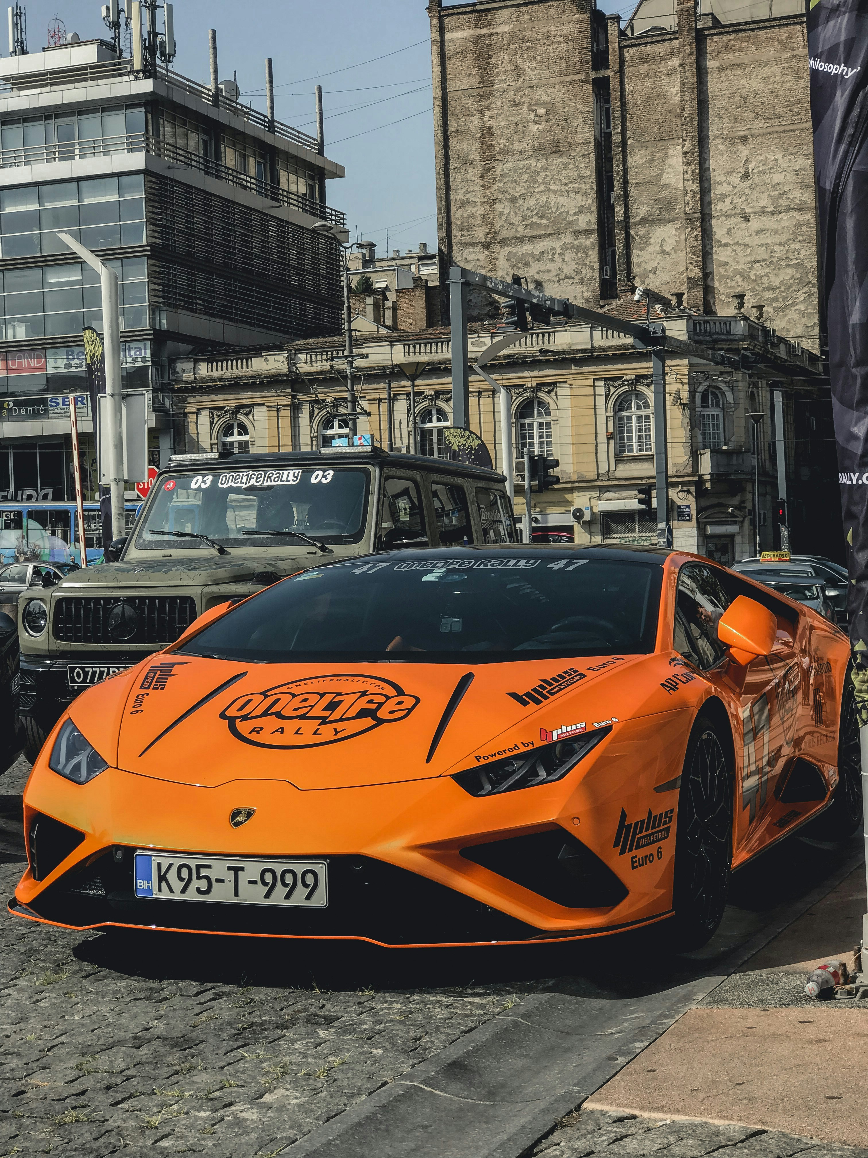 Citrus Flame on Cobblestones: A Lamborghini Huracan in Urban Spotlight