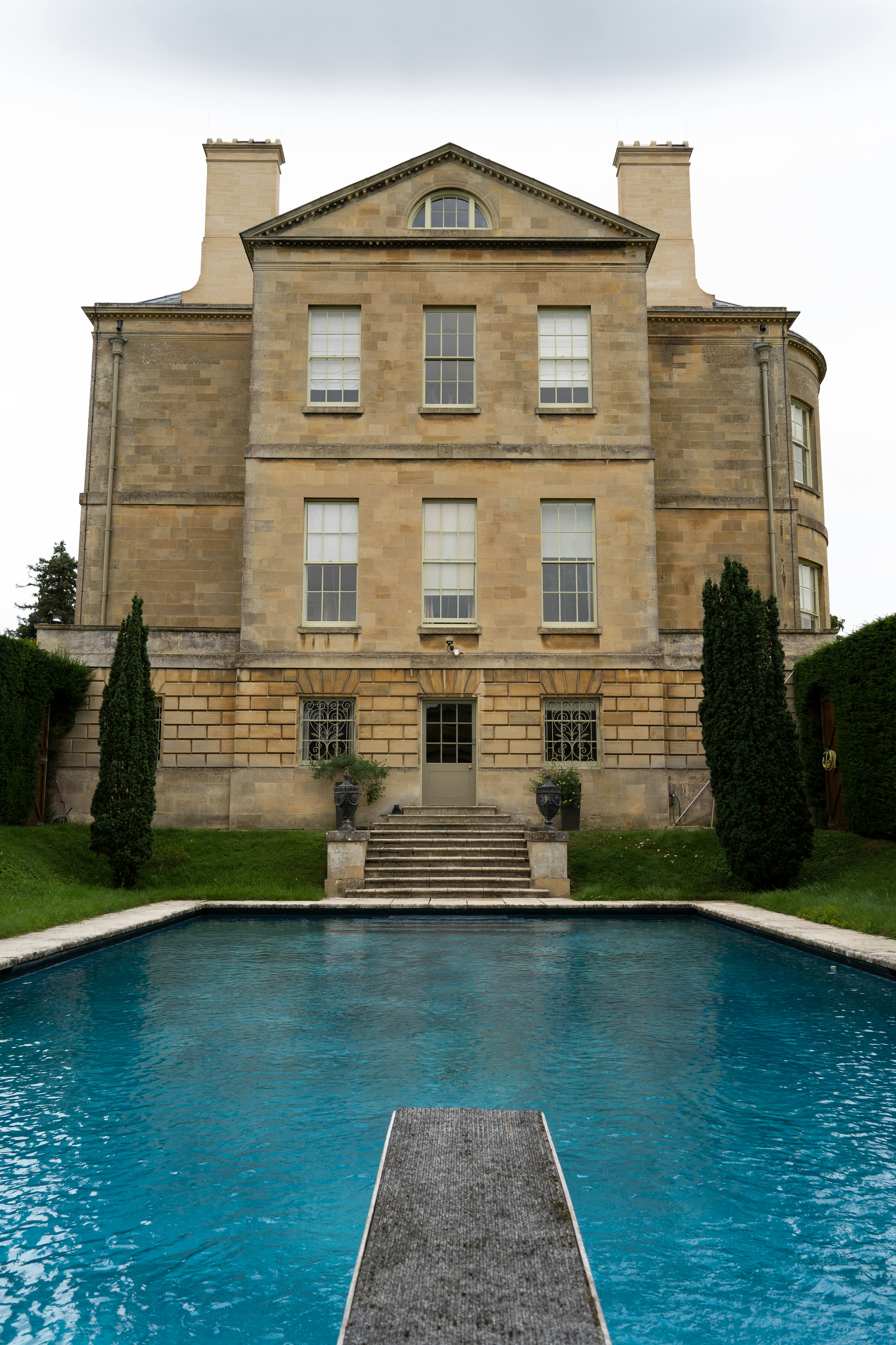 Brown concrete building near swimming pool during daytime photo – Free ...