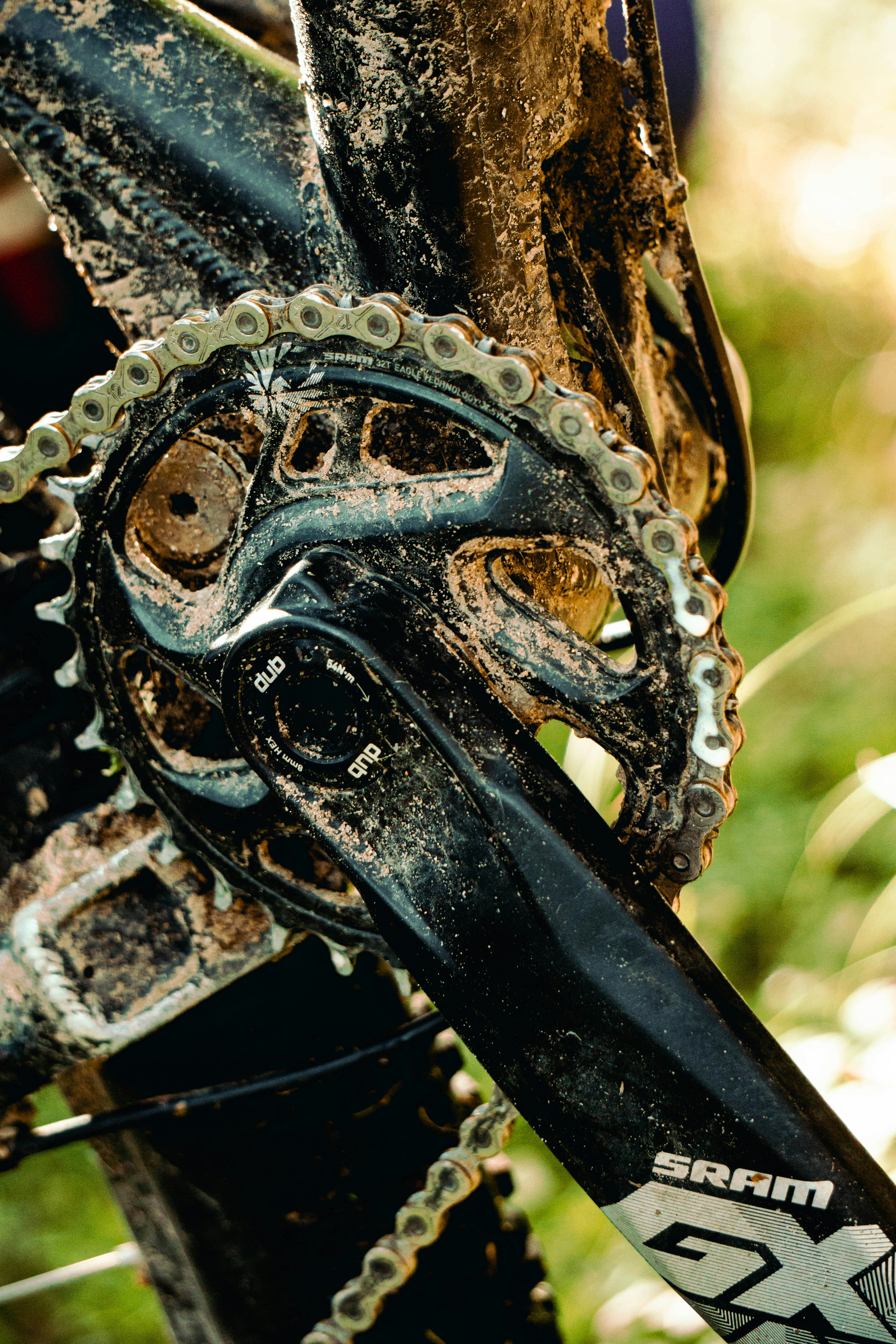 Grit and Gear: Mud-Slick Close-Up of a SRAM GX Crankset
