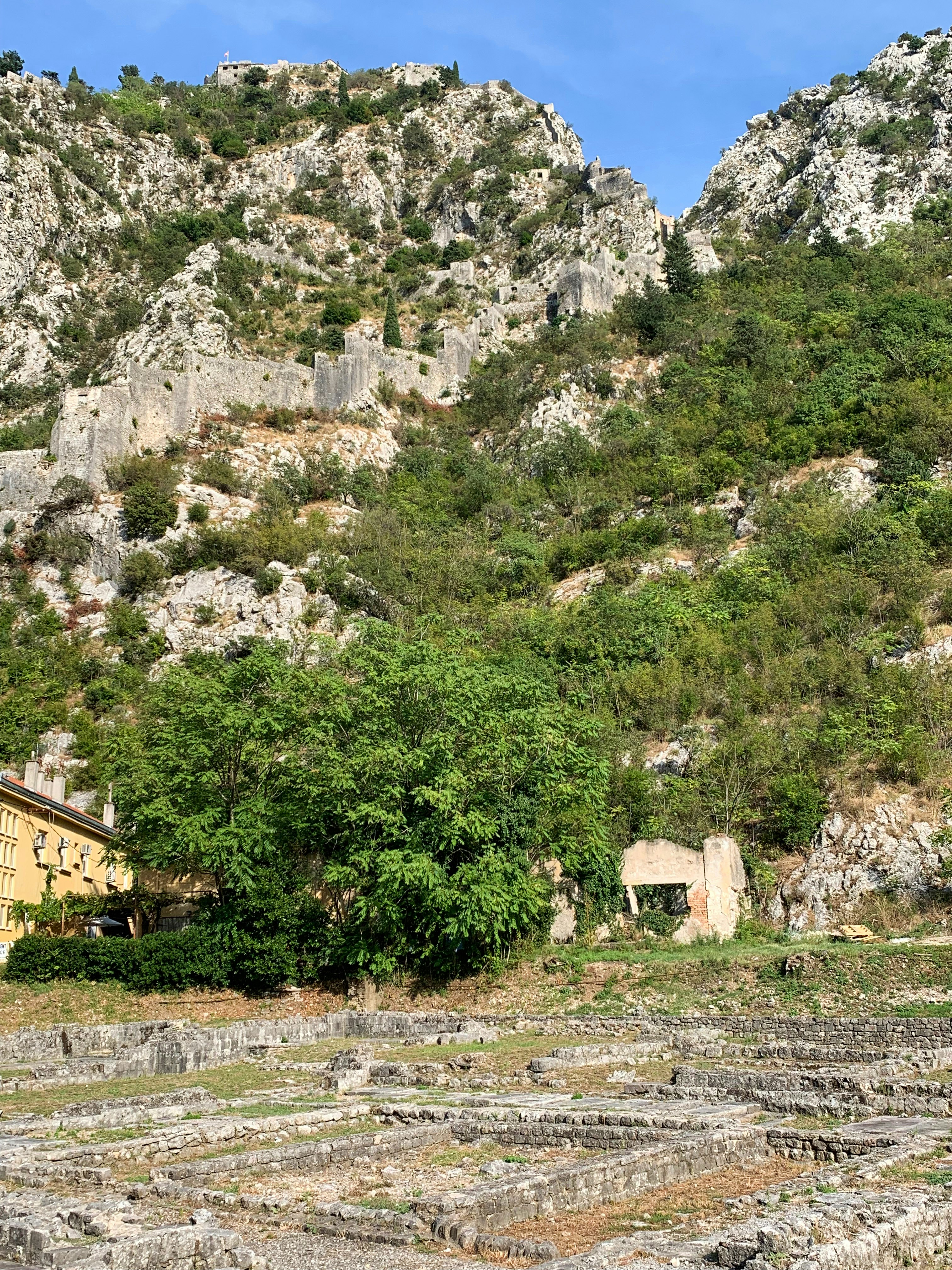 Cliffside Fortress Above Verdant Terraces