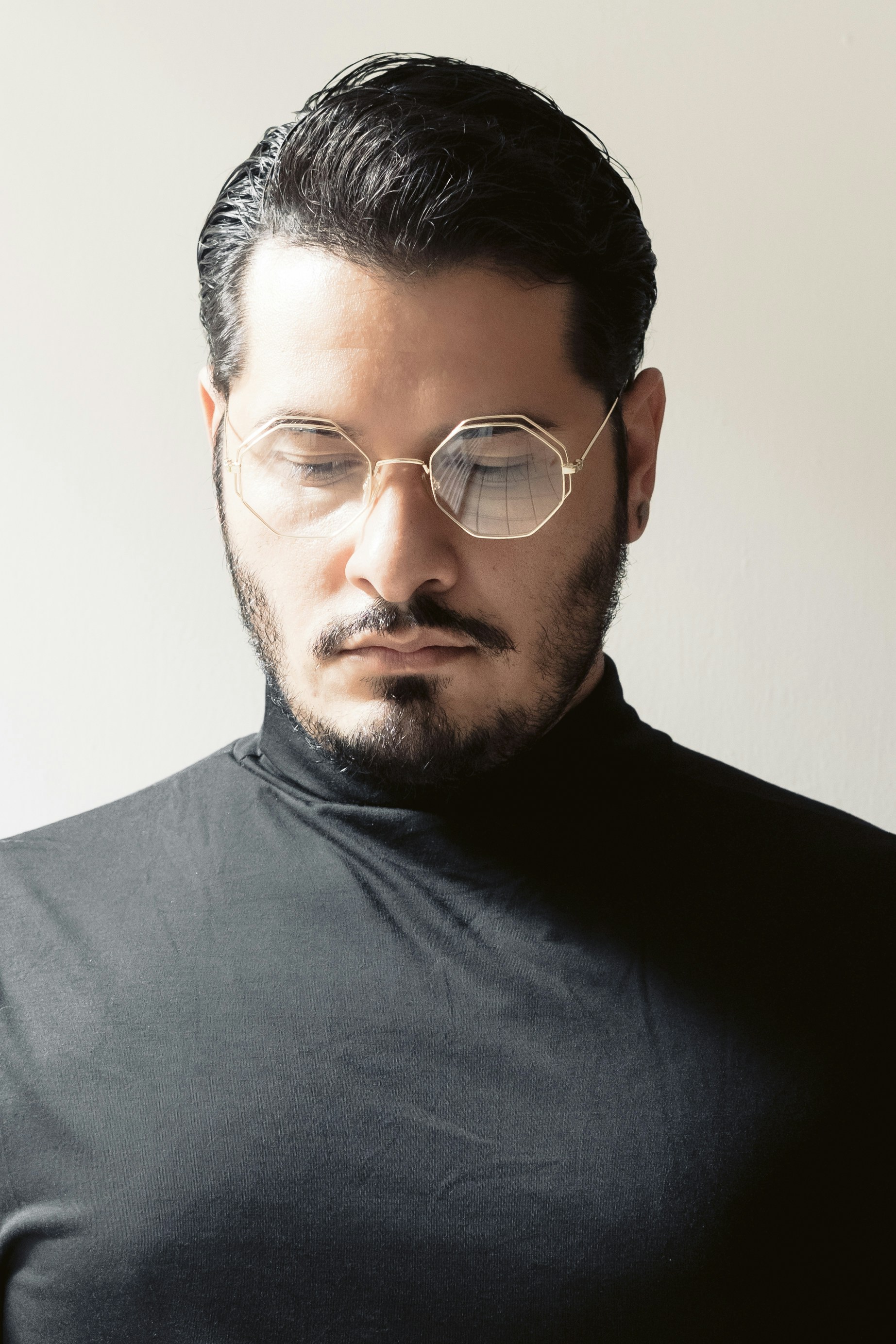 Midnight Glasses: Quiet Intensity in Soft Light
