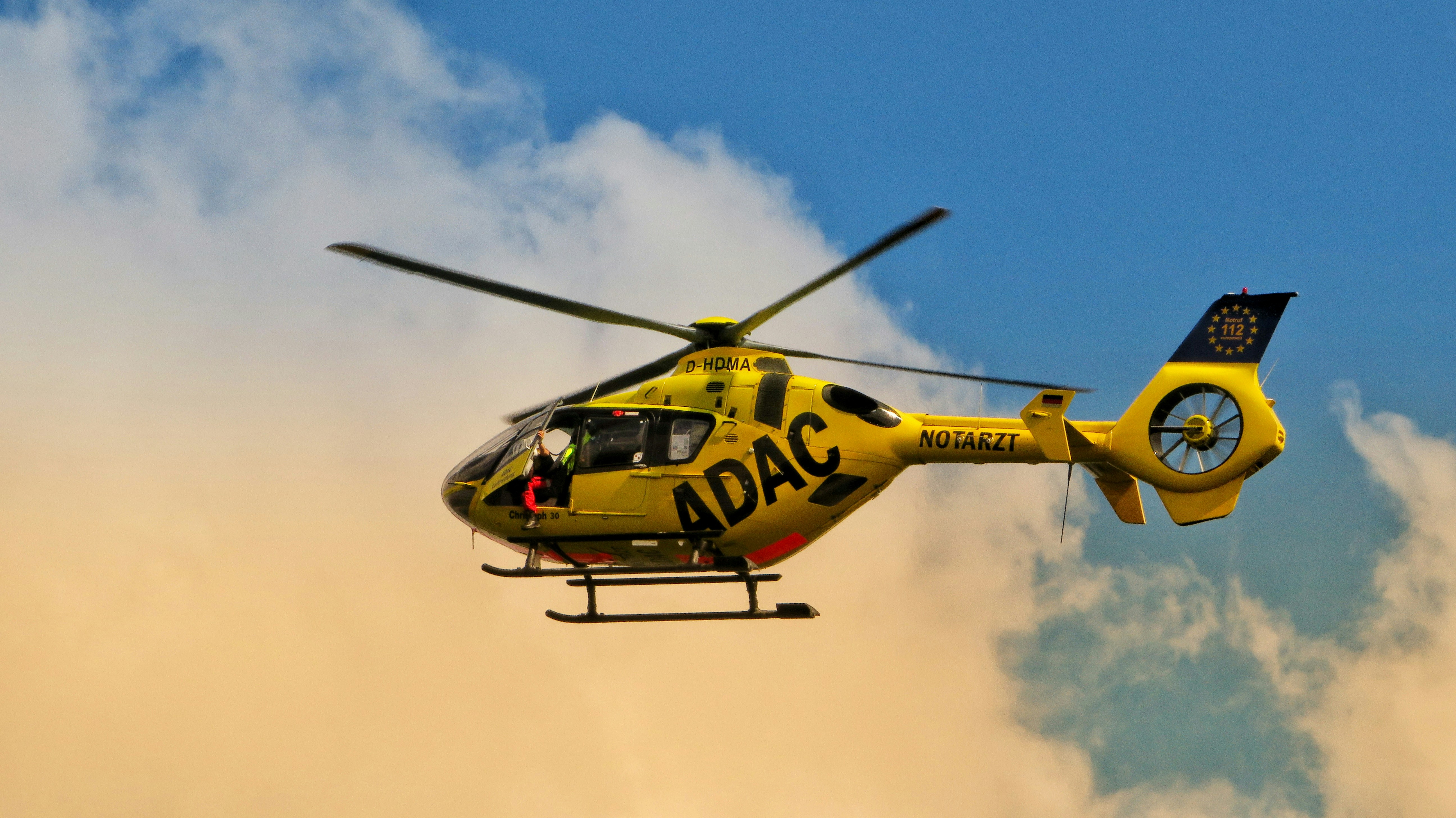 Yellow and red helicopter flying in the sky photo – Free Salzgittersee ...