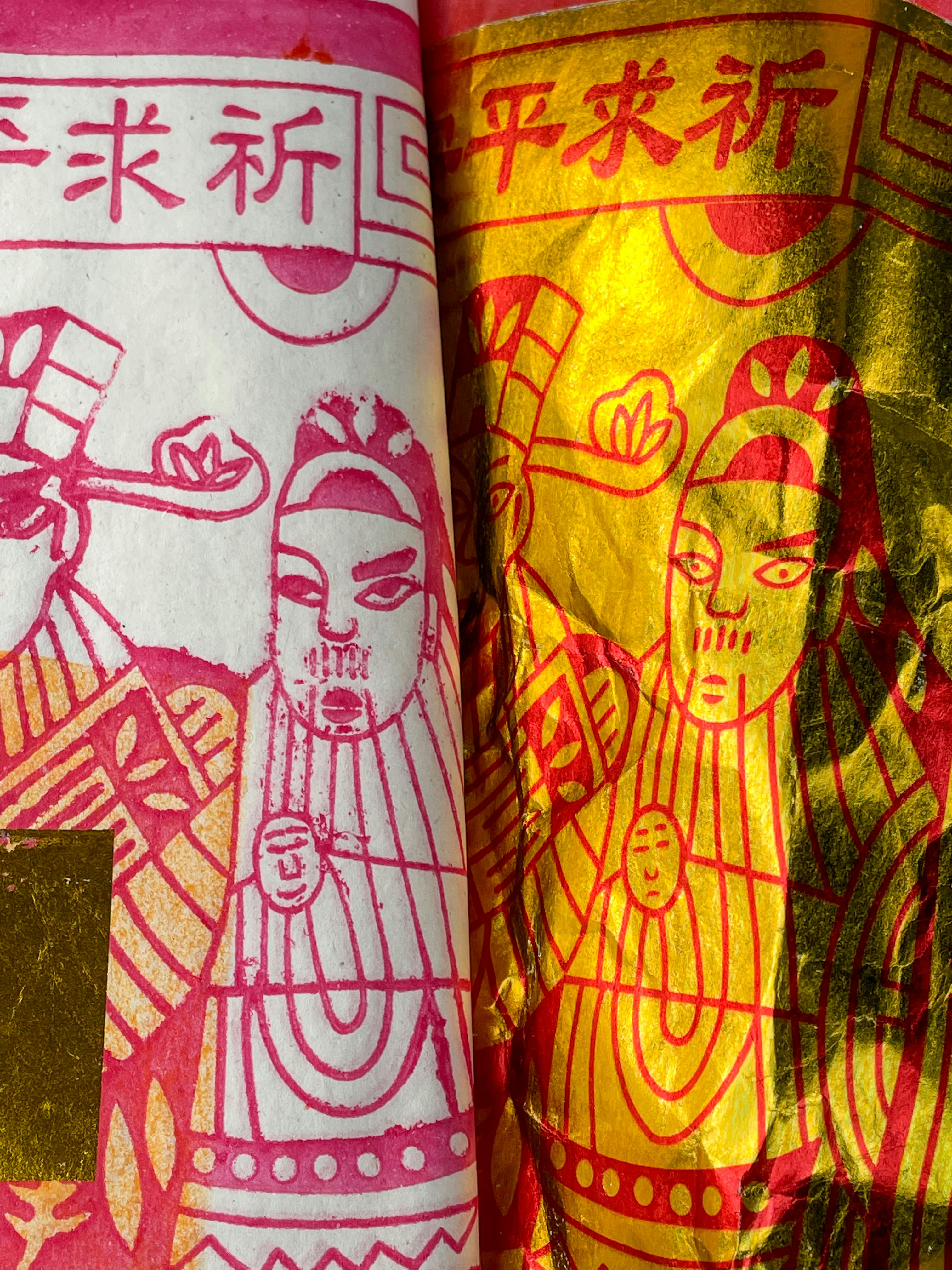 Dual Talisman: Red and Gold Blessings on Paper Fold