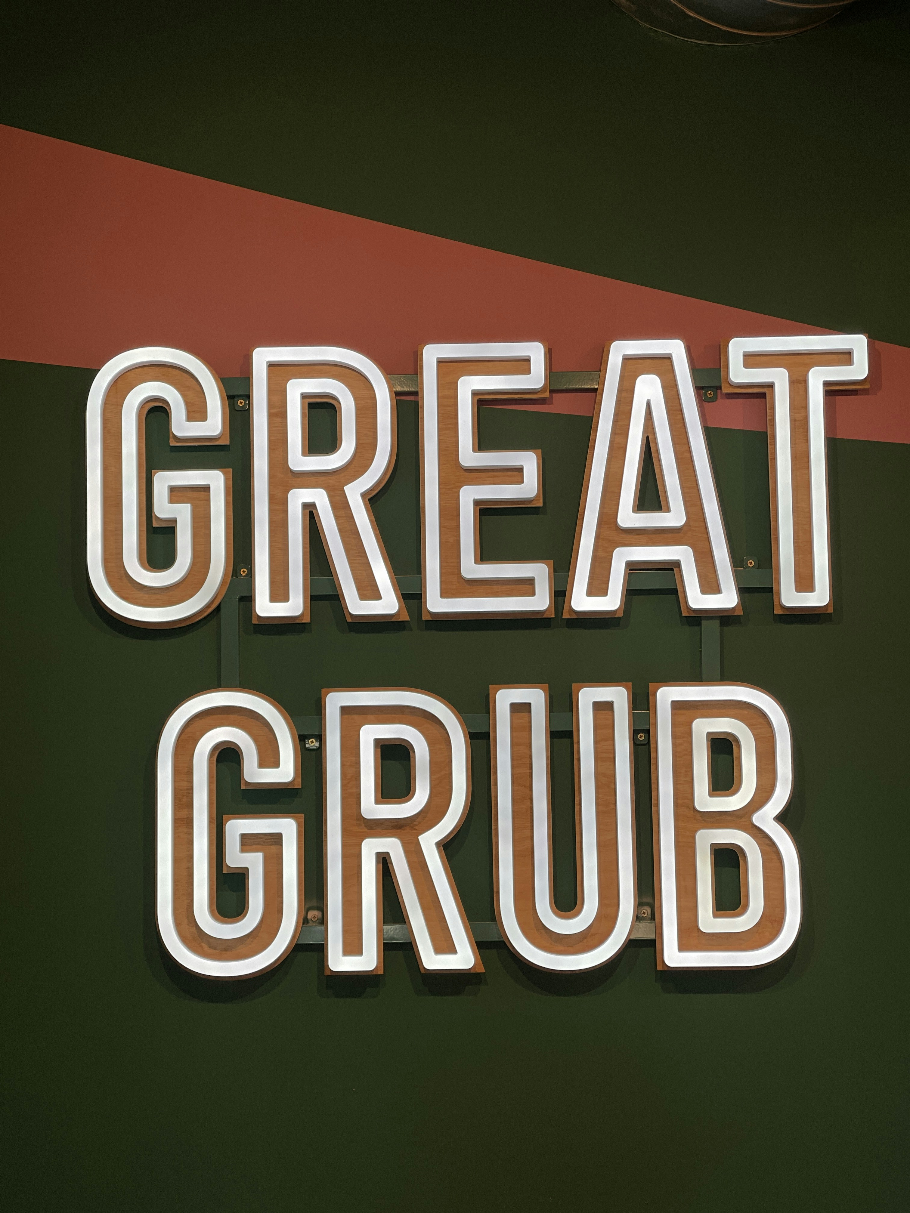 A sign that says great grub on the side of a building photo – Free ...
