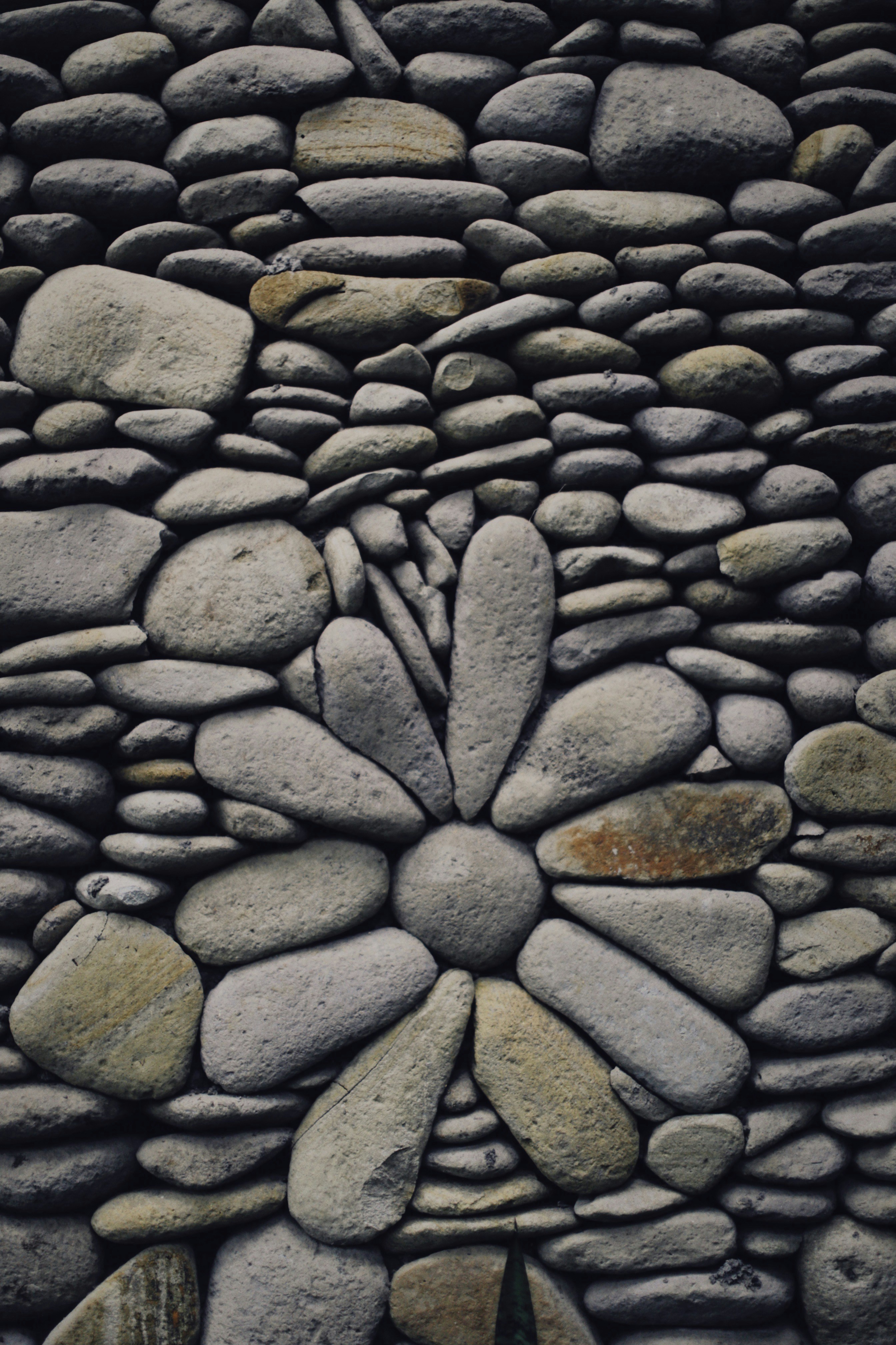 Stone mandala: a radial arrangement of smooth pebbles
